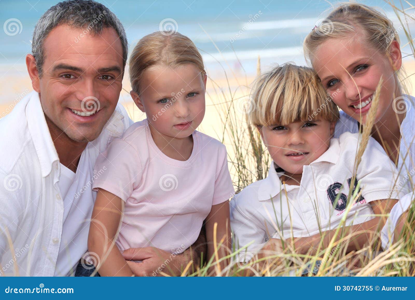 Family in the sand dunes stock image. Image of group - 30742755
