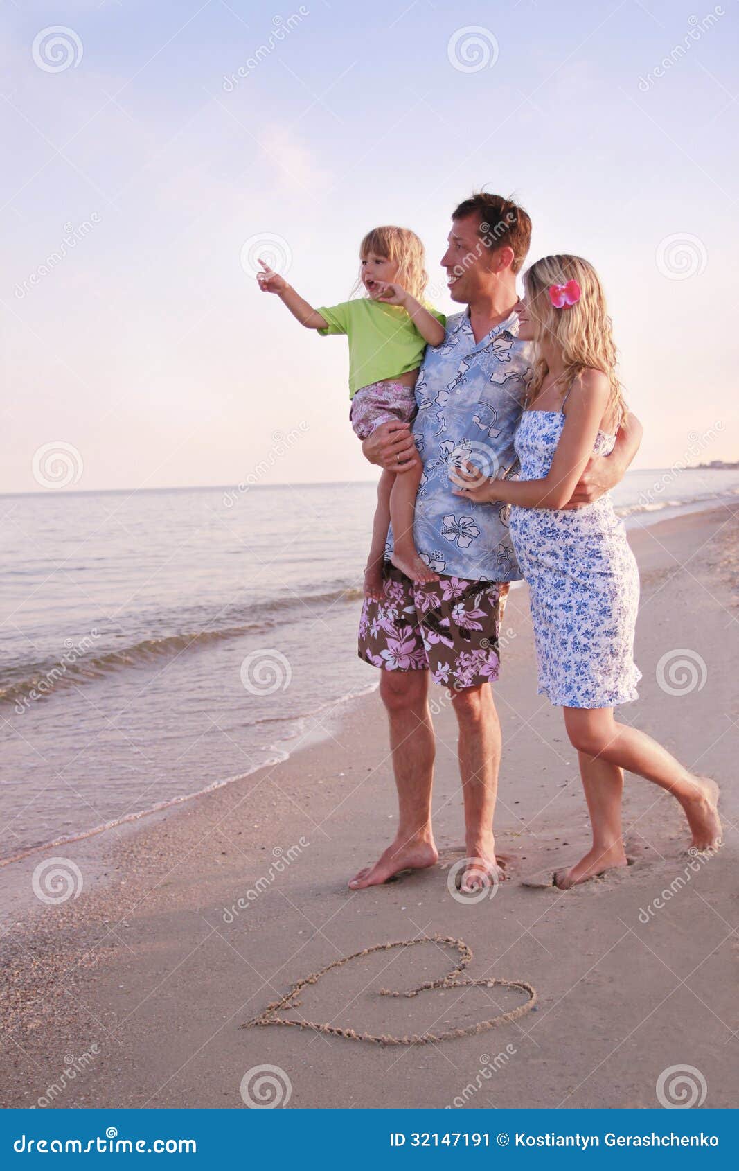 Family on the sea stock image. Image of play, sand, family - 32147191