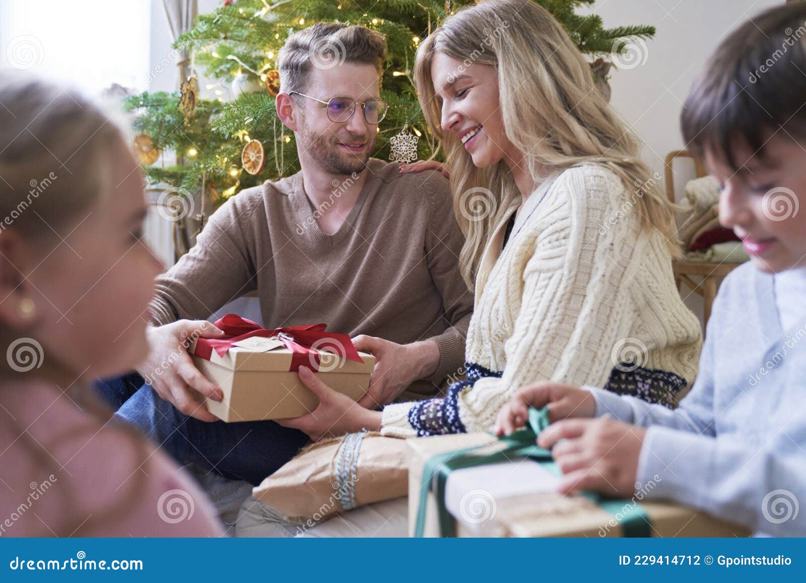 Christmas time with family stock photo. Image of clothing - 229414712