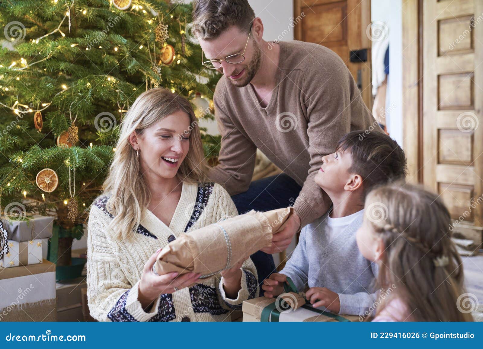 Christmas time with family stock photo. Image of love - 229416026