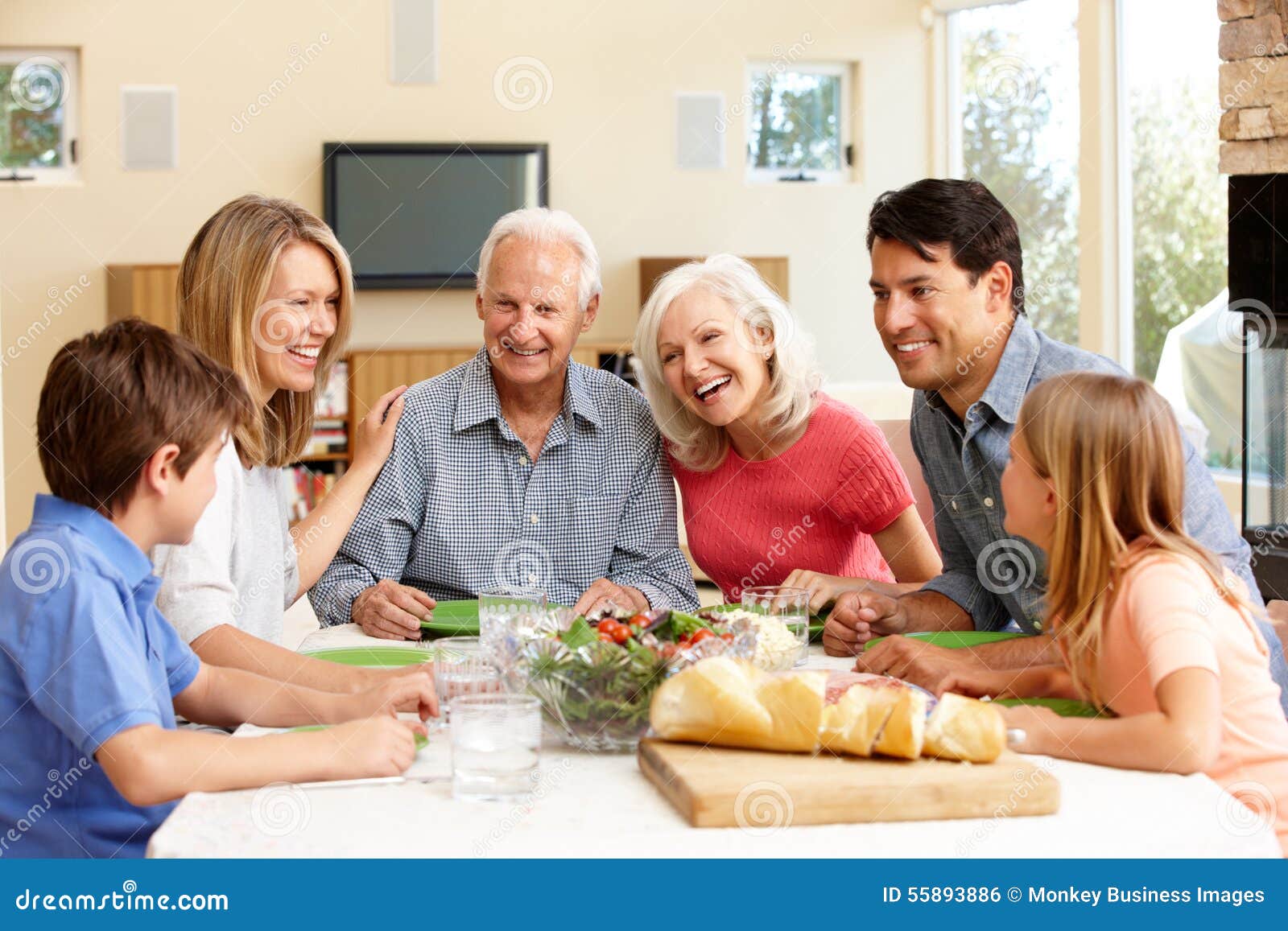 Family sharing meal stock photo. Image of enjoying, home - 55893886