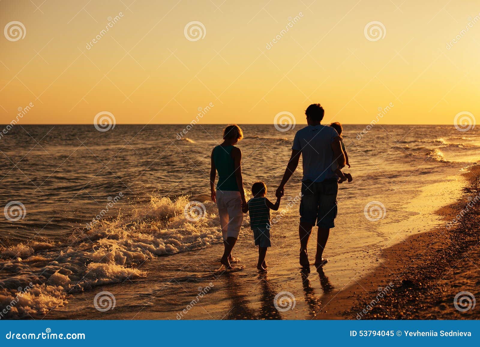 Family Silhouettes on Beach at Sunset Stock Image - Image of daddy ...