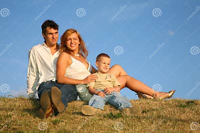 Family sit on the meadow stock image. Image of sitting - 3358493