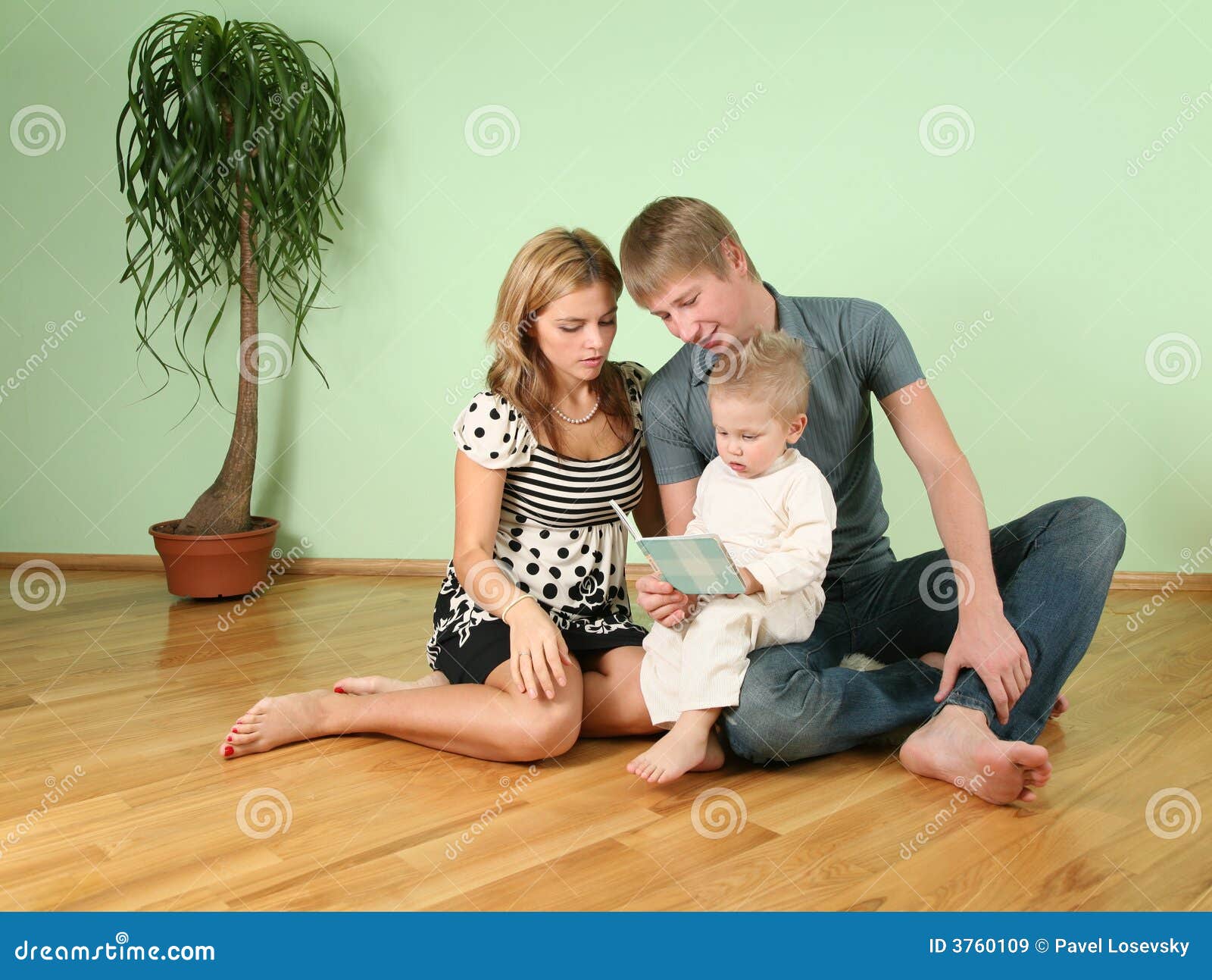 Family Sit in the Room on Floor Stock Image - Image of home, child: 3760109