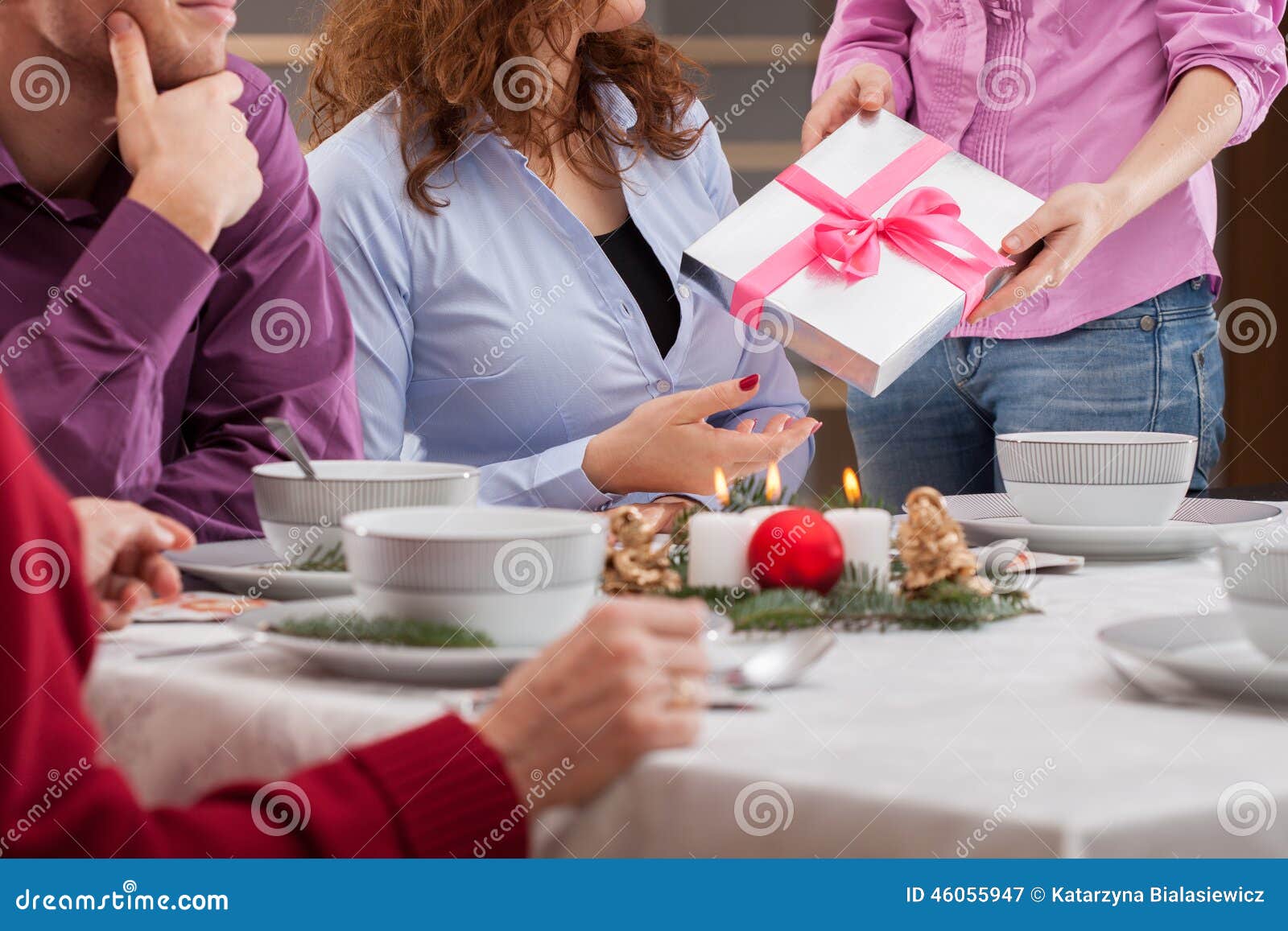 Family Sitting Around the Table Stock Image - Image of surprise ...