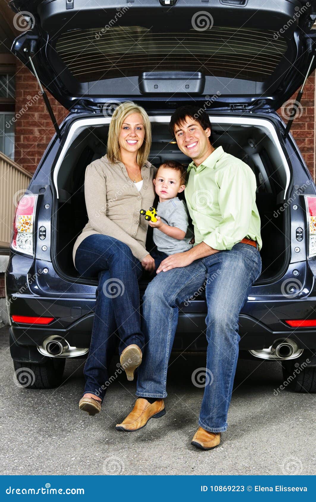 Family Sitting in Back of Car Stock Image - Image of hatch, smiling ...