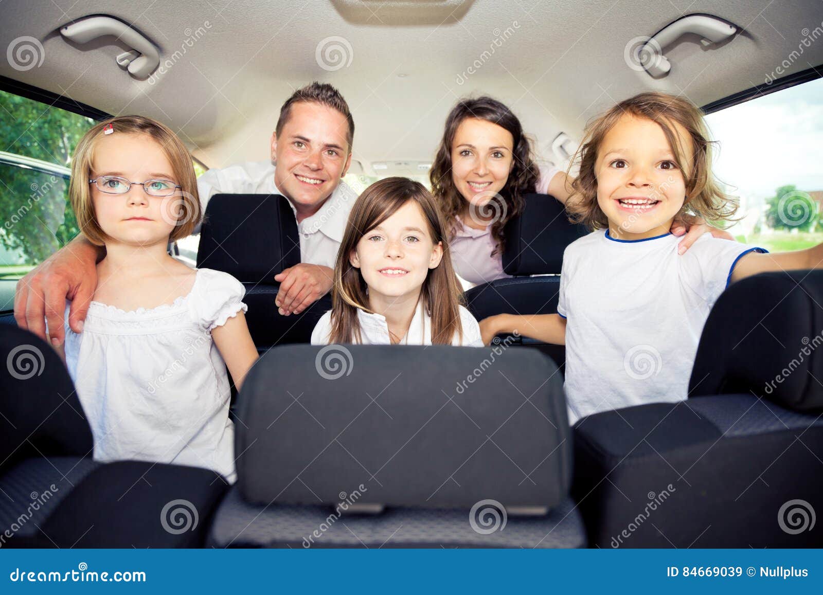 Family Sitting Inside Their Car Stock Image - Image of posing ...