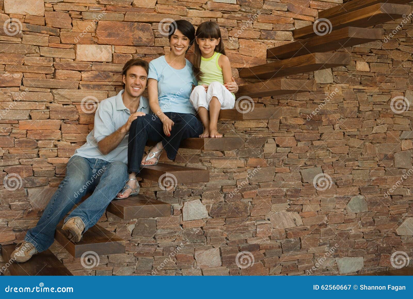 Family sitting on steps stock image. Image of daughter - 62560667