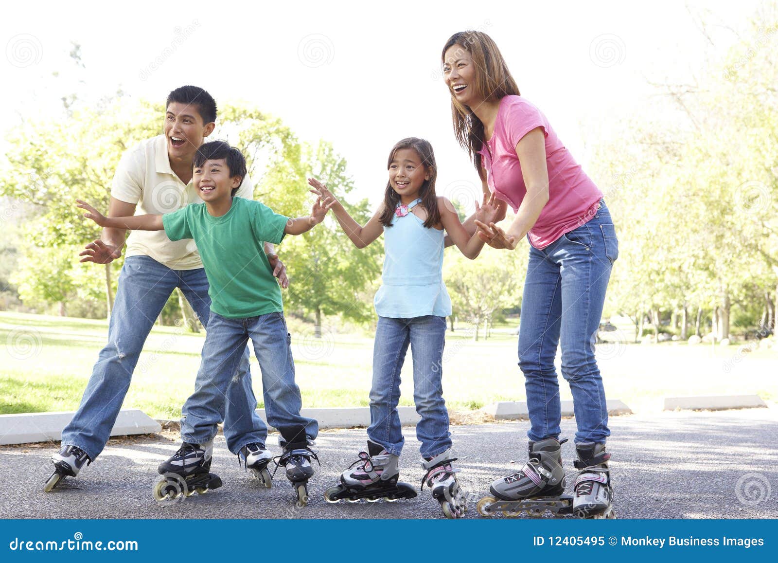 Family Skating in the Park stock image. Image of mother - 12405495