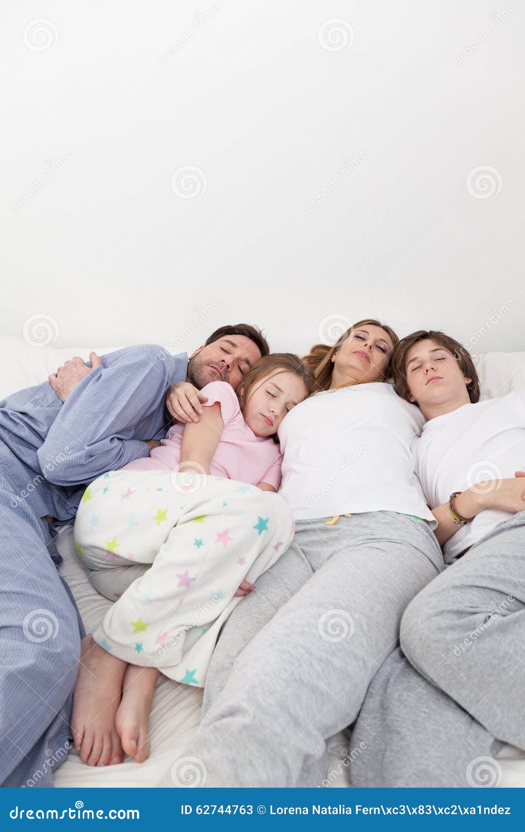 Family sleeping stock image. Image of couple, home, love - 62744763