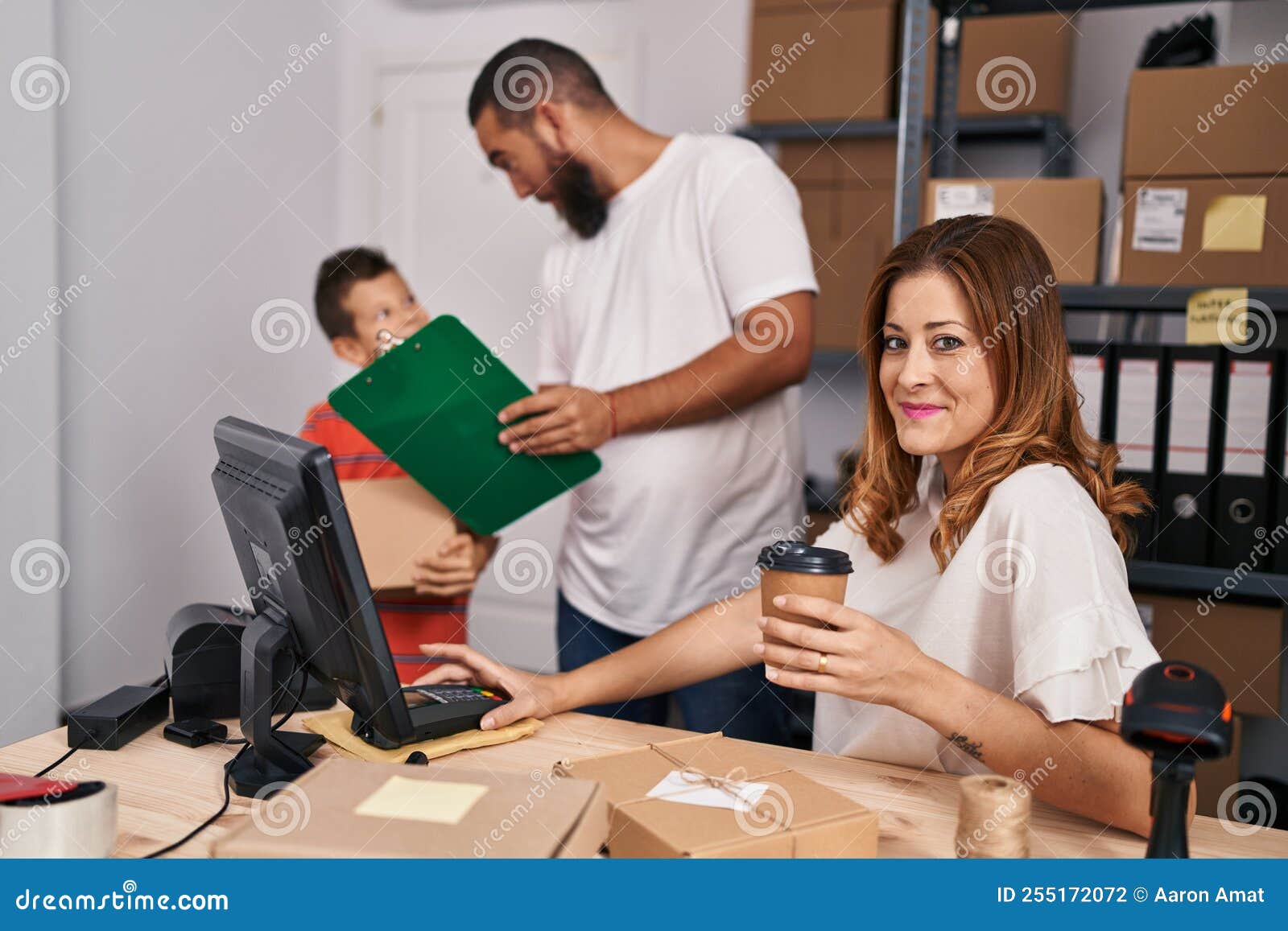 Family Smiling Confident Working at Storehouse Stock Photo - Image of ...