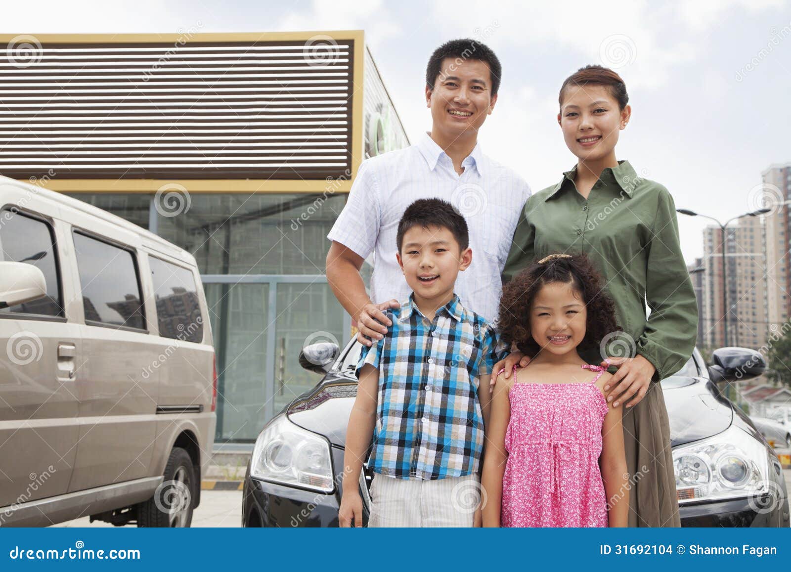Family Smiling in Front of the Car, Portrait Stock Photo - Image of ...