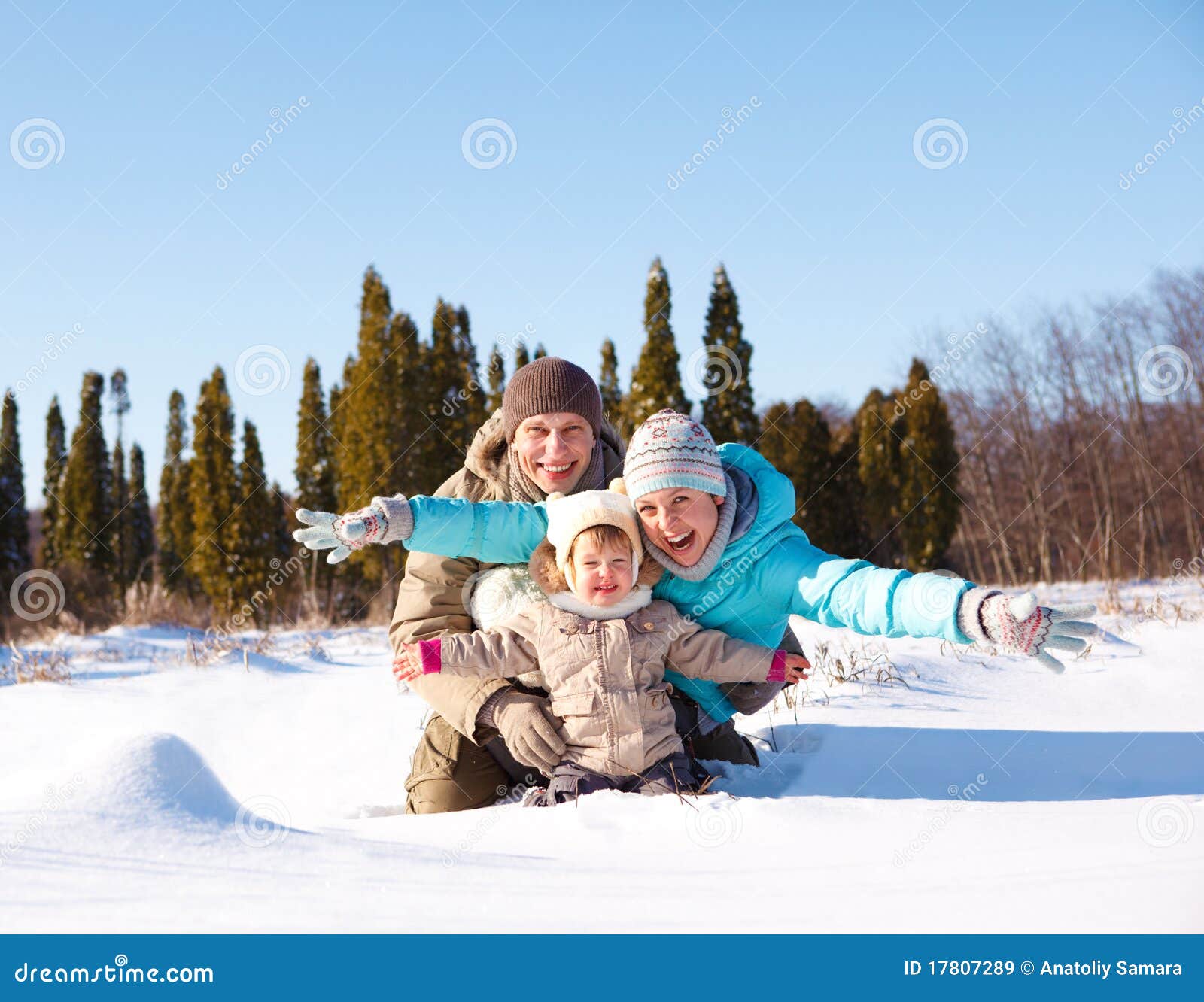 Family in snow stock image. Image of lifestyle, outside - 17807289
