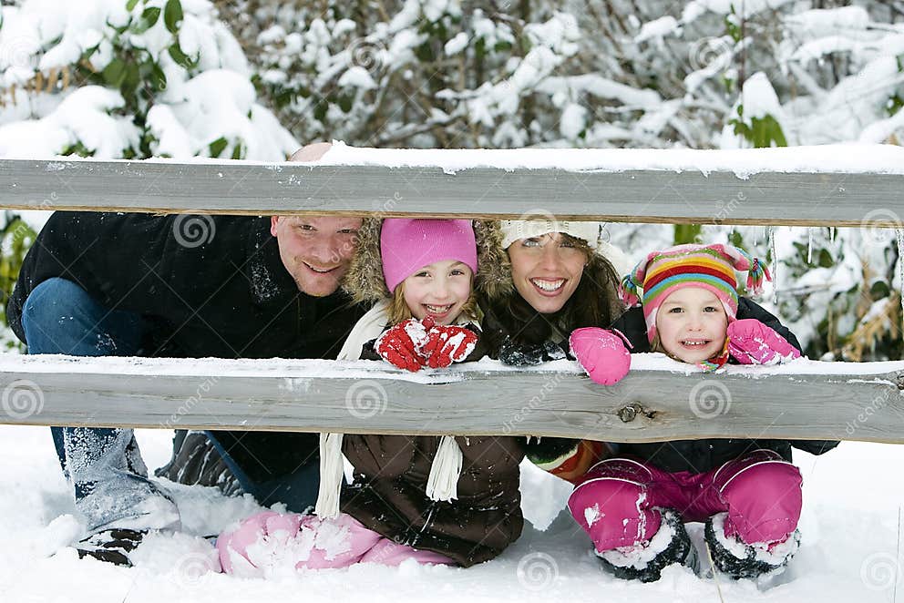 Family in the snow stock photo. Image of happy, child - 18790932