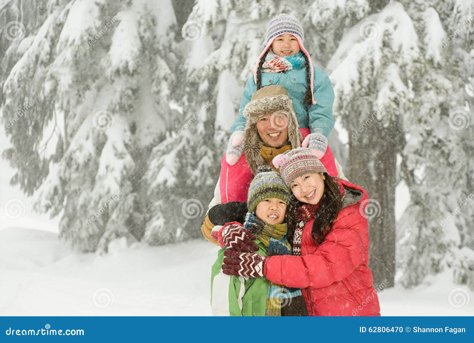 Family in the snow stock photo. Image of affection, outdoor - 62806470