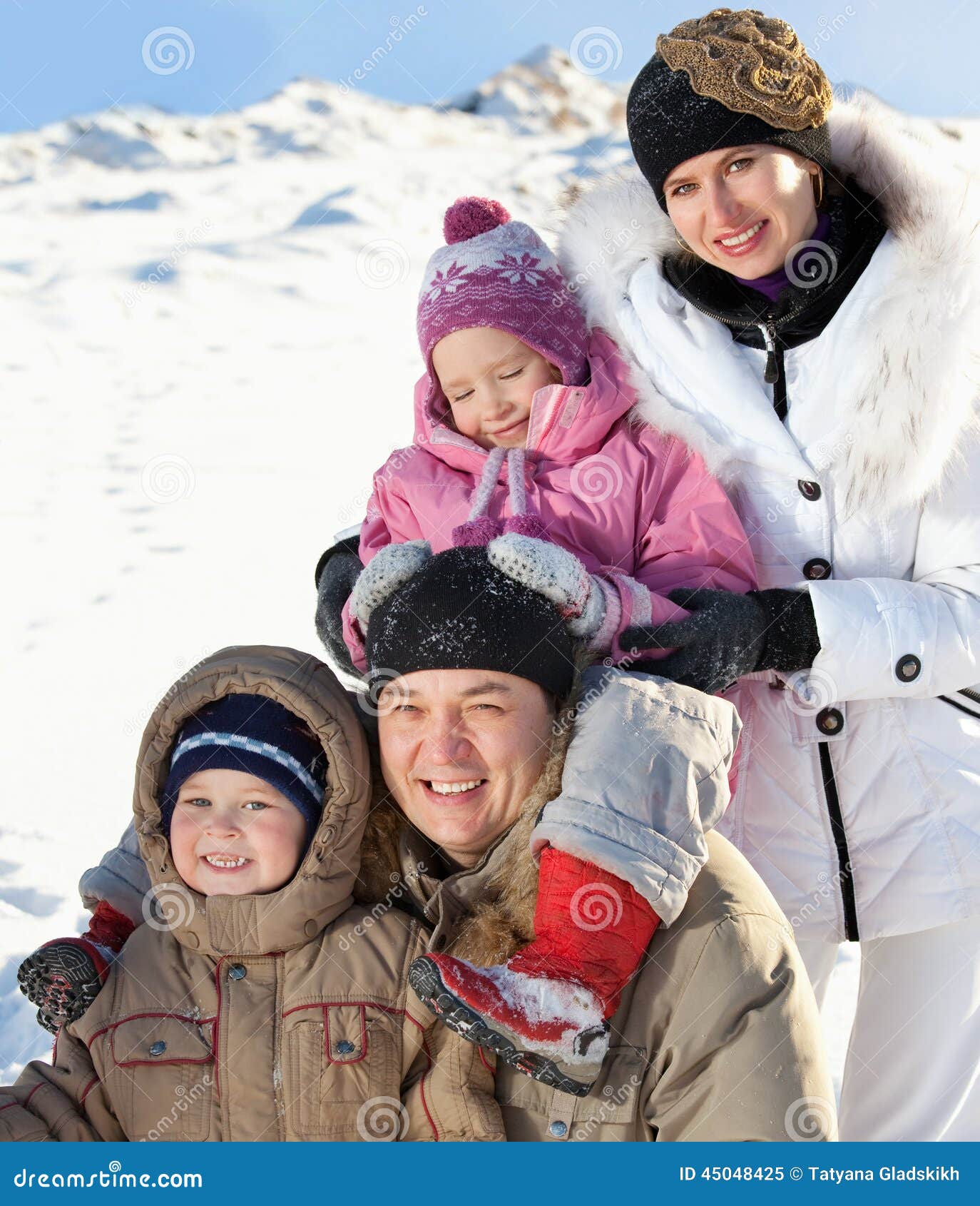 Family on snow stock image. Image of people, kids, portrait - 45048425