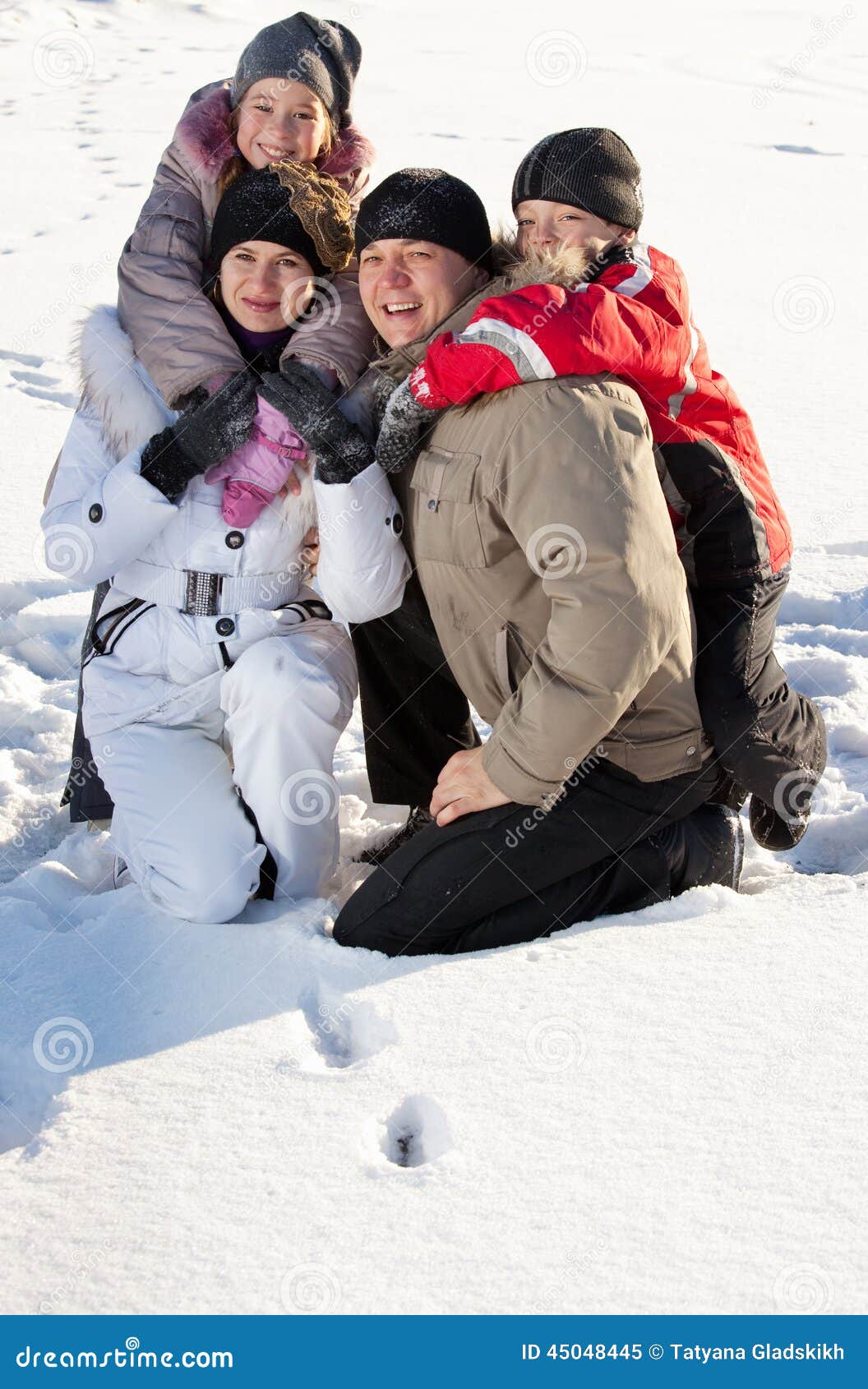 Family on snow stock image. Image of outdoors, snow, people - 45048445