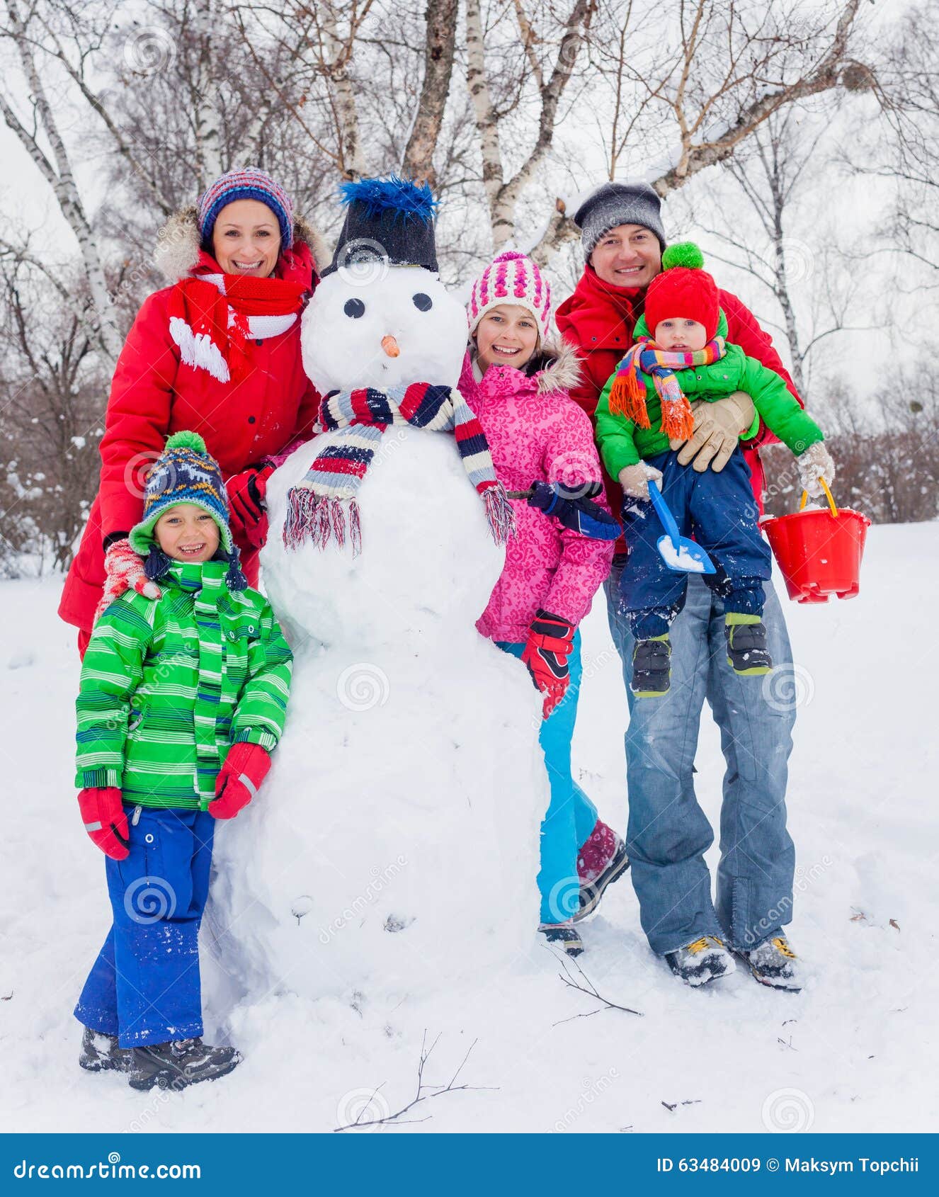 Family with a snowman stock image. Image of funny, baby - 63484009