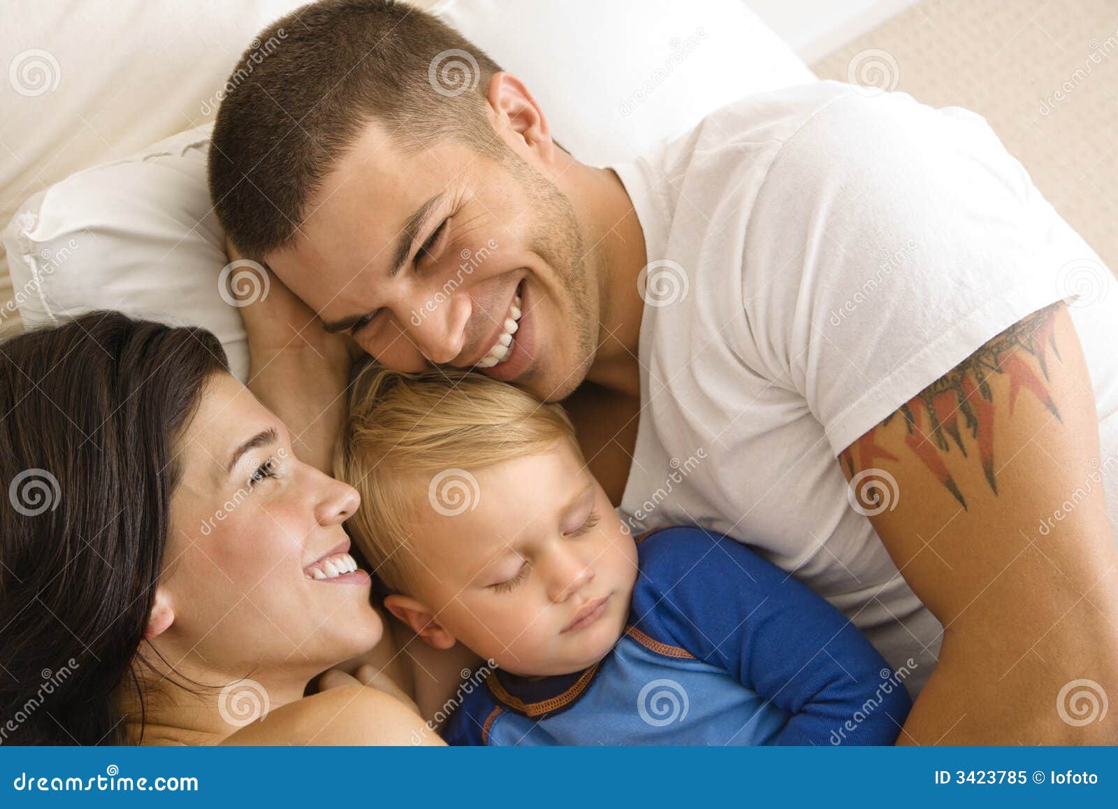 Family snuggling. stock image. Image of colour, father - 3423785