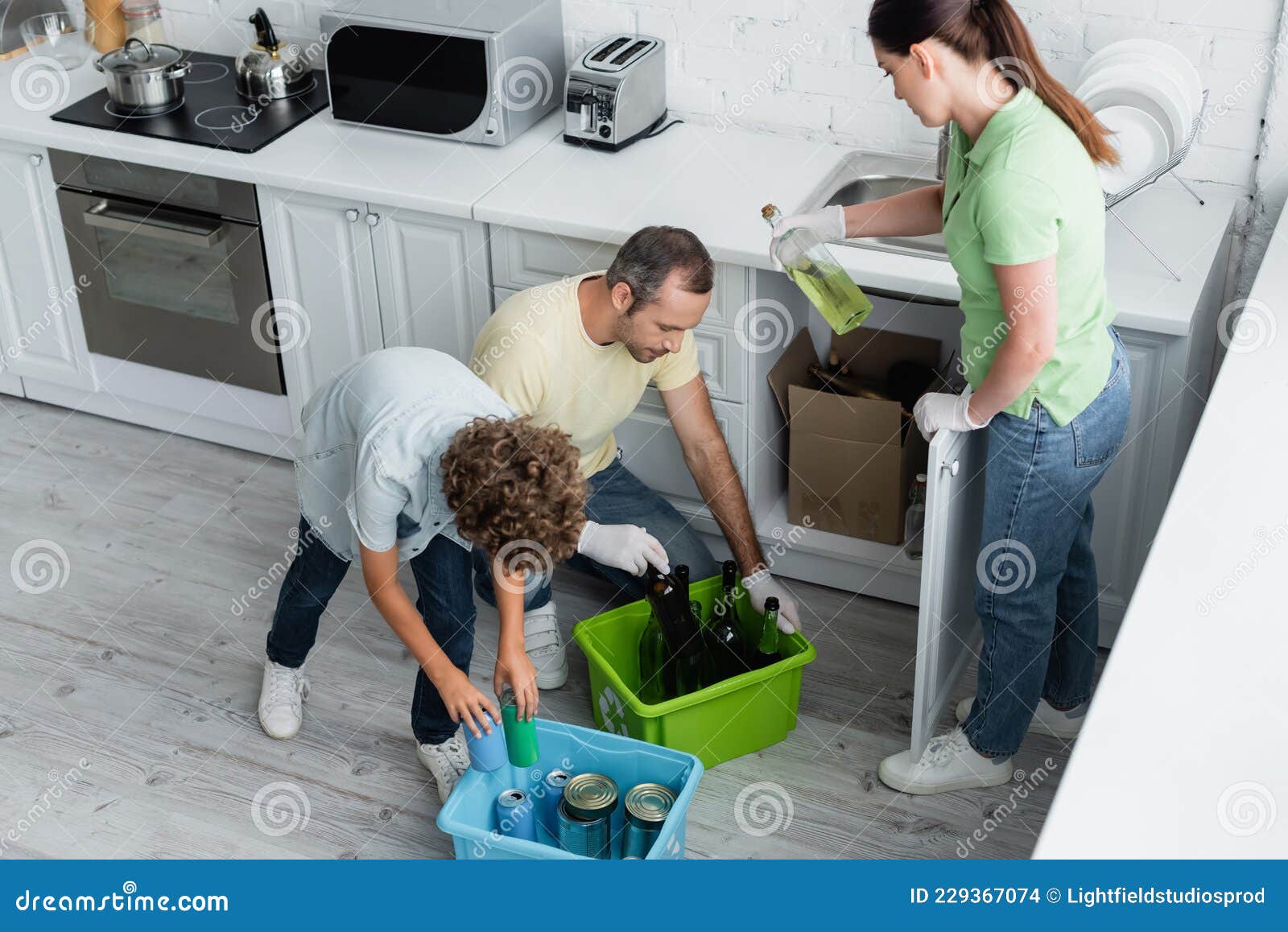 Family with Son Sorting Trash in Stock Photo - Image of care, garbage ...