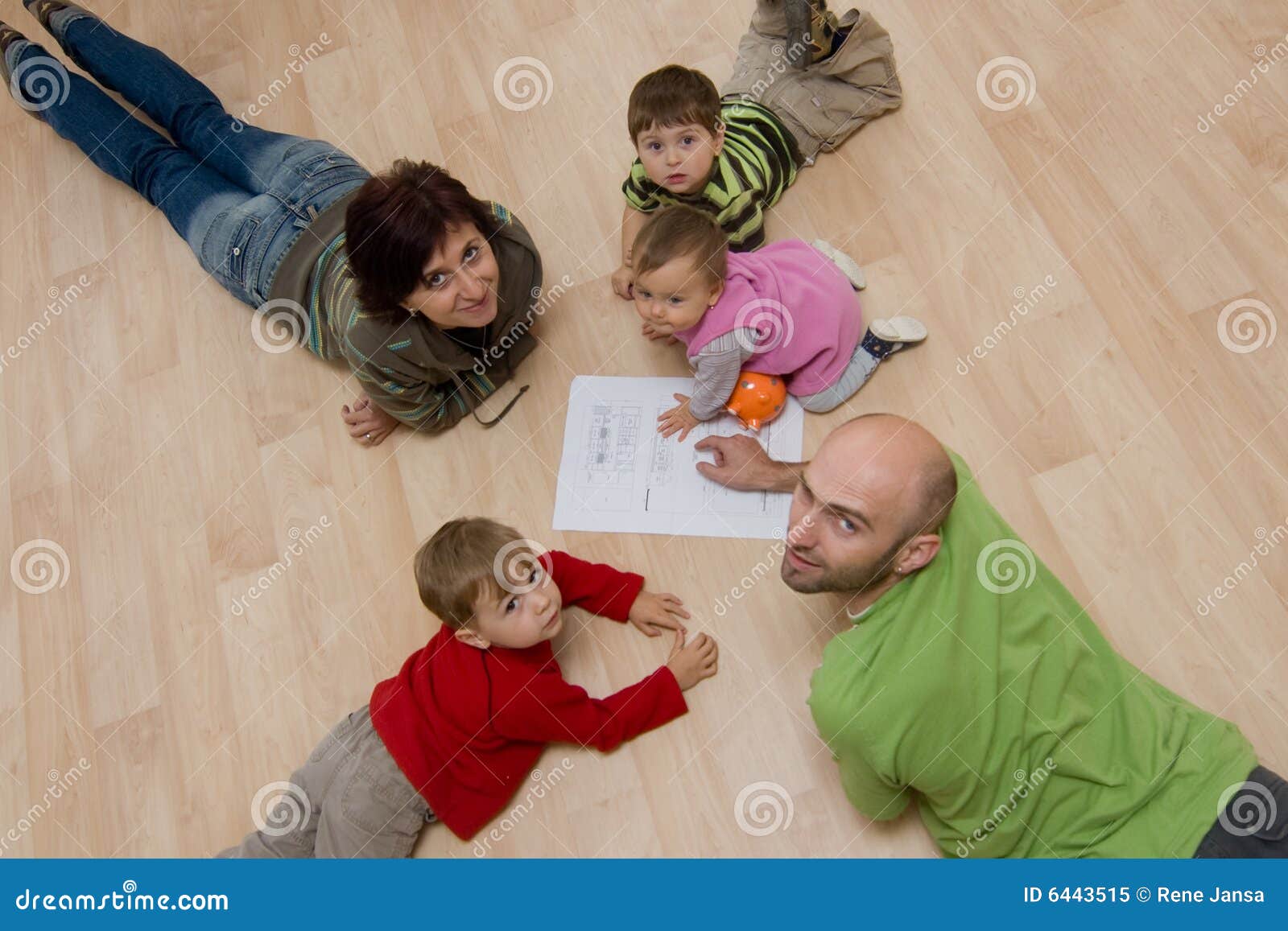 Family Sprawled Out on Floor Stock Image - Image of group, baby: 6443515