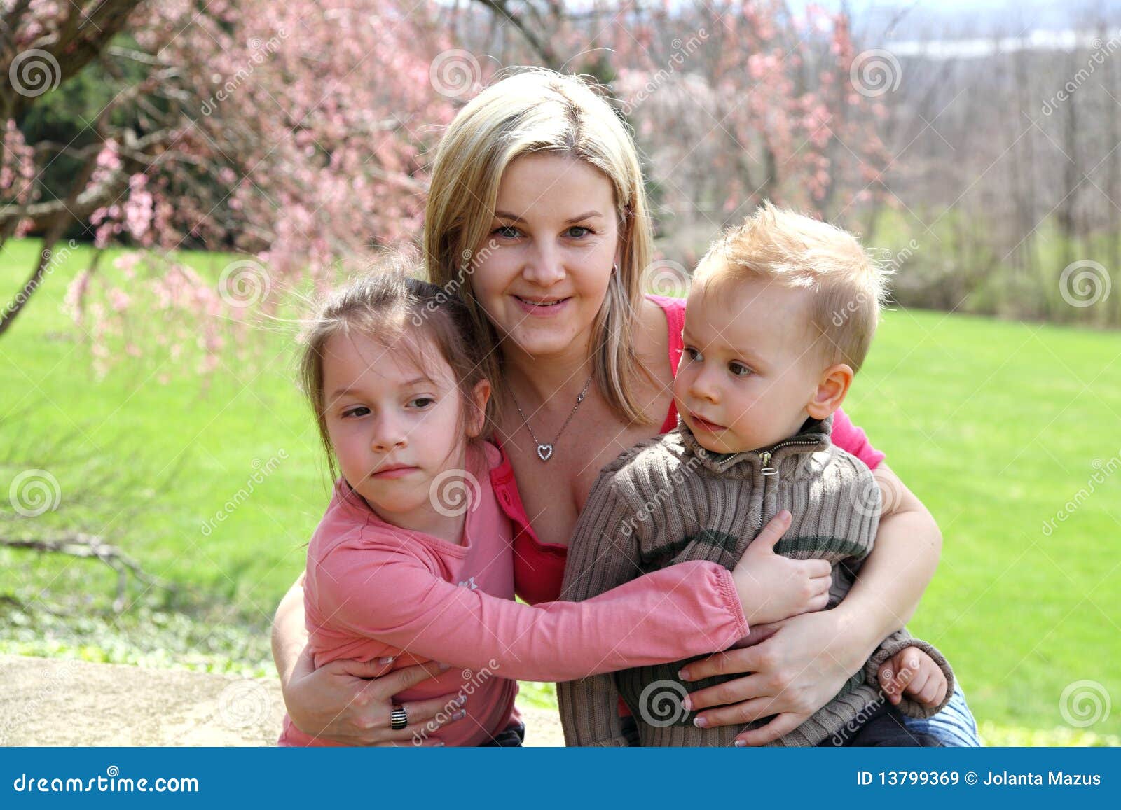 Family in spring park stock image. Image of hugging, cute - 13799369