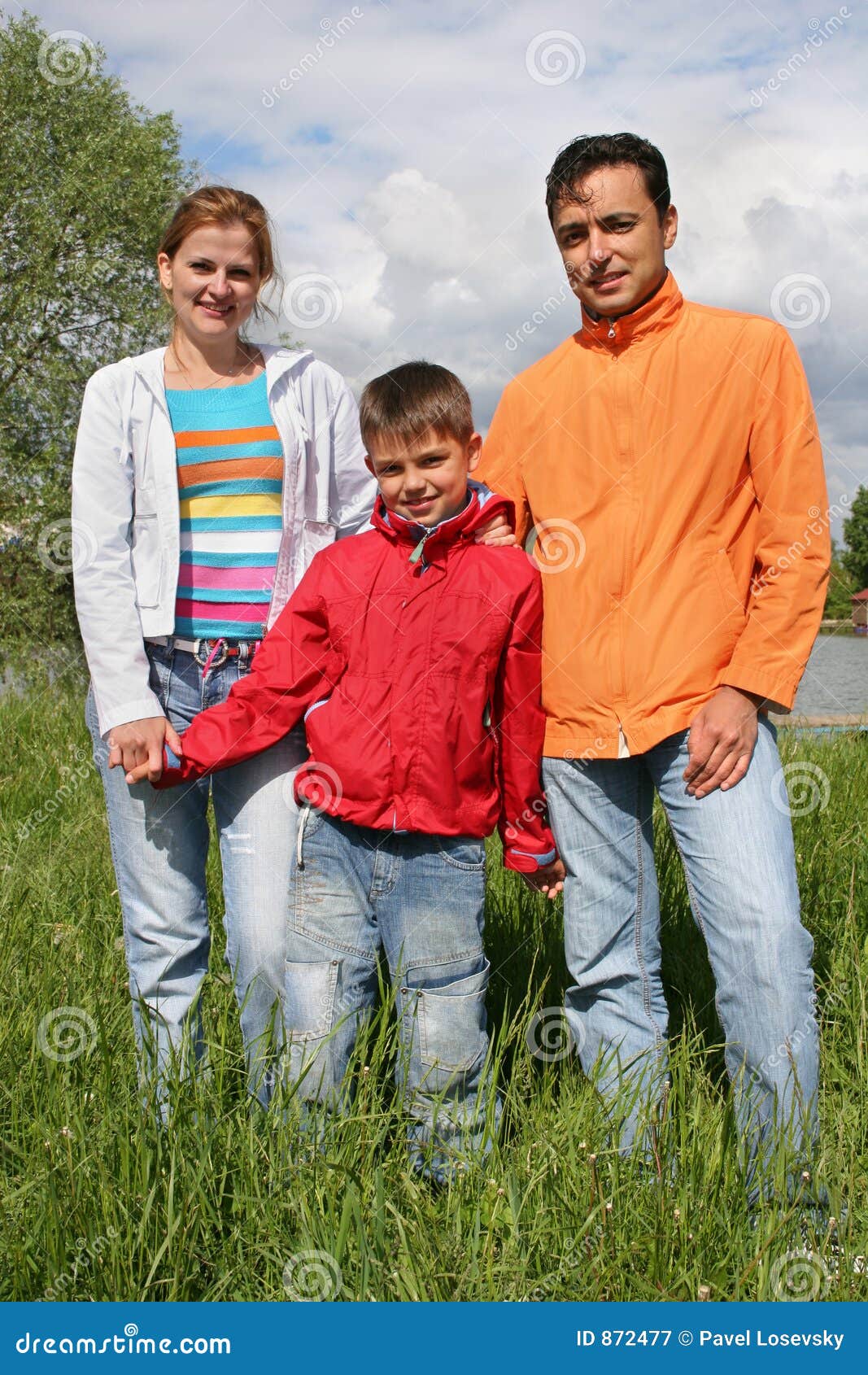 Family stand on grass stock image. Image of kirtle, garden - 872477