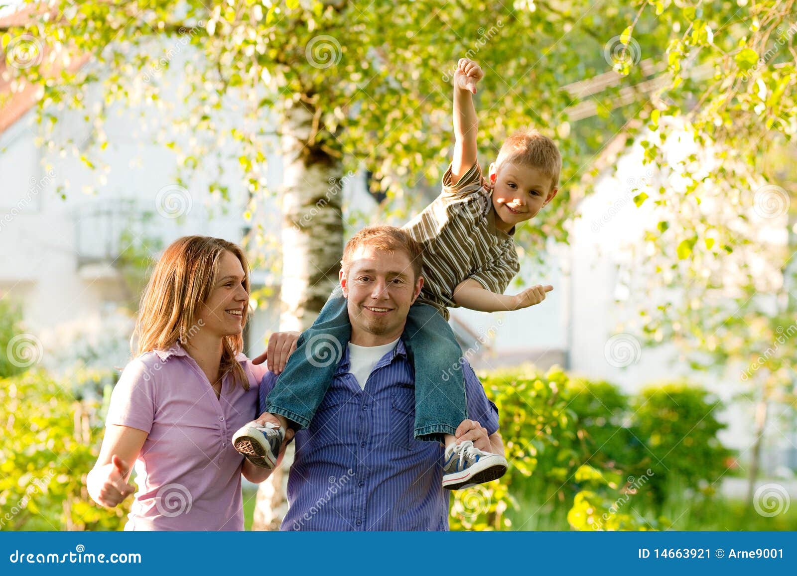 Family Standing in Front of Homes Stock Image - Image of parents, child ...