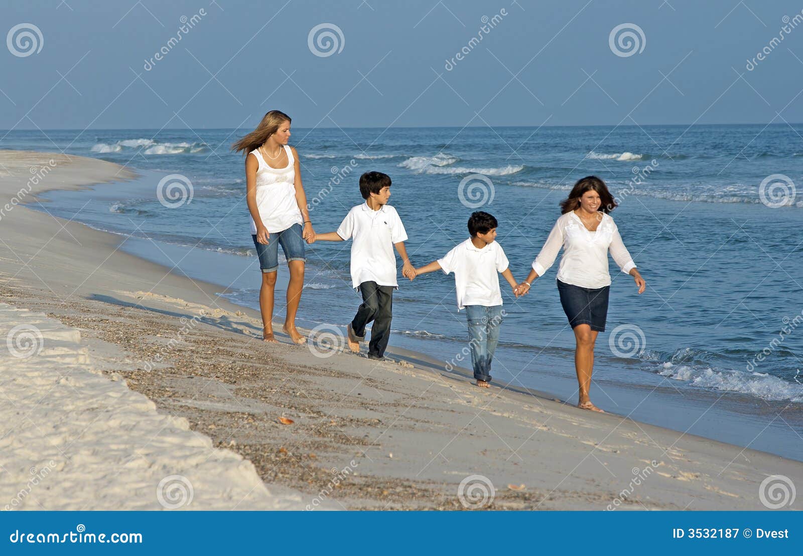 Family Stroll stock image. Image of family, sand, holiday - 3532187
