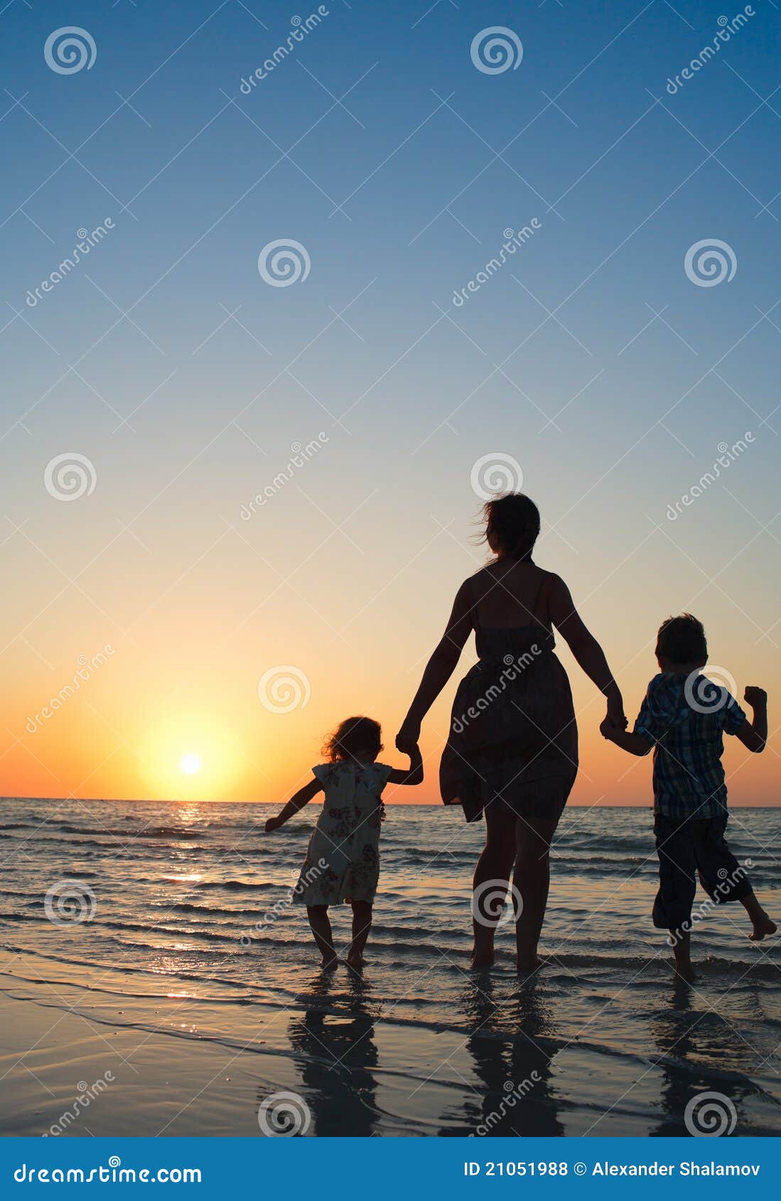 Family at sunset stock photo. Image of coastline, lifestyle - 21051988