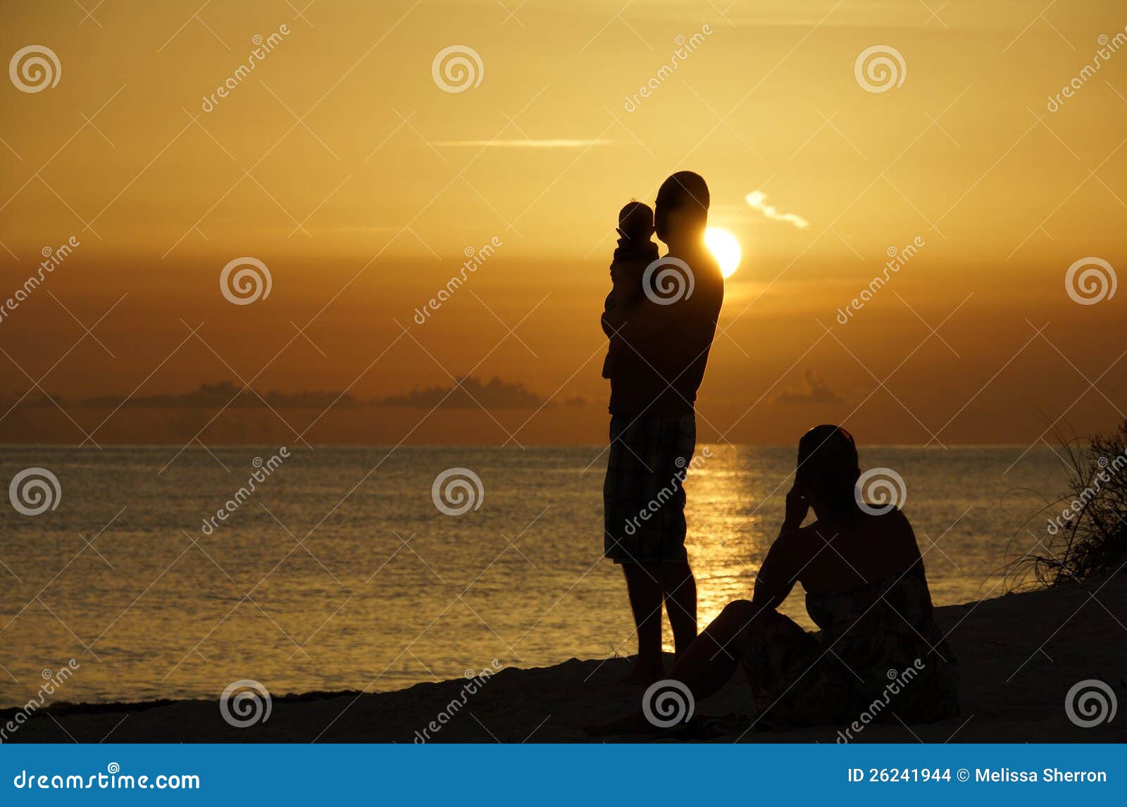 Family at Sunset stock photo. Image of ocean, beauty - 26241944