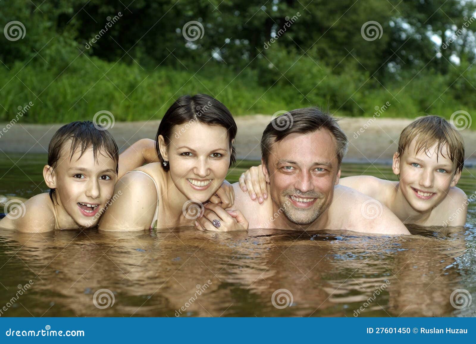 Family swims in the river stock photo. Image of baby - 27601450