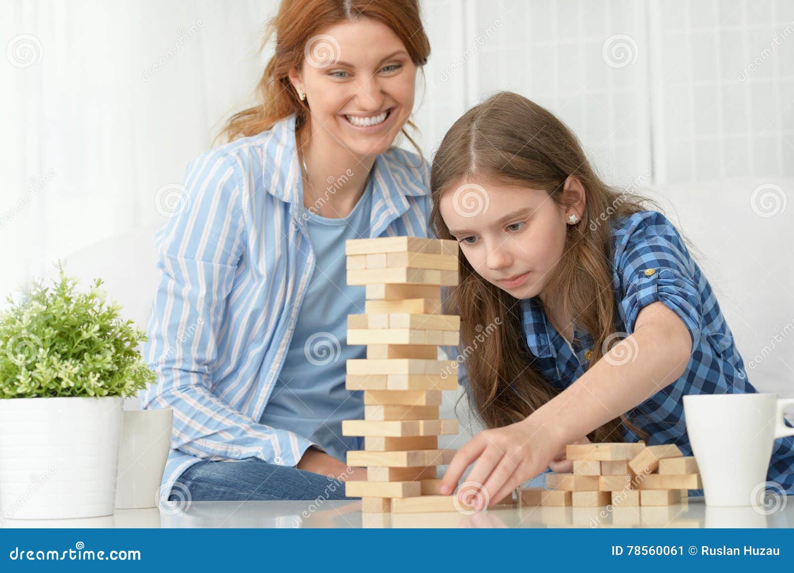 Family at the Table Playing Board Game Stock Image - Image of laptop ...