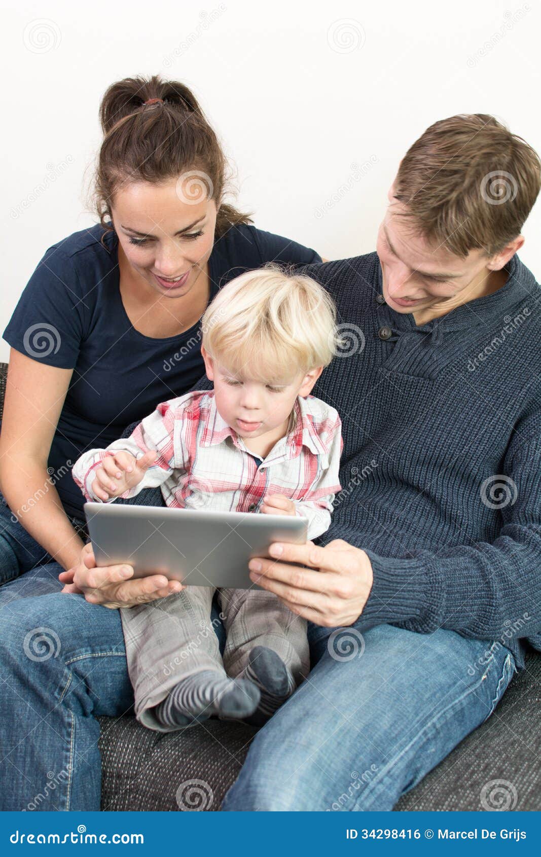 Family on tablet pc stock photo. Image of game, modern - 34298416