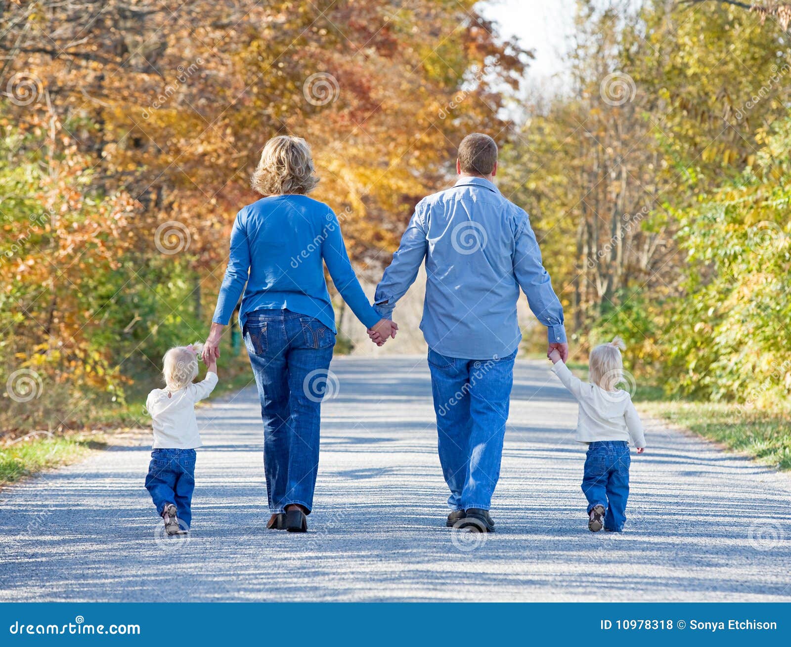 Family Taking a Walk stock photo. Image of american, family - 10978318