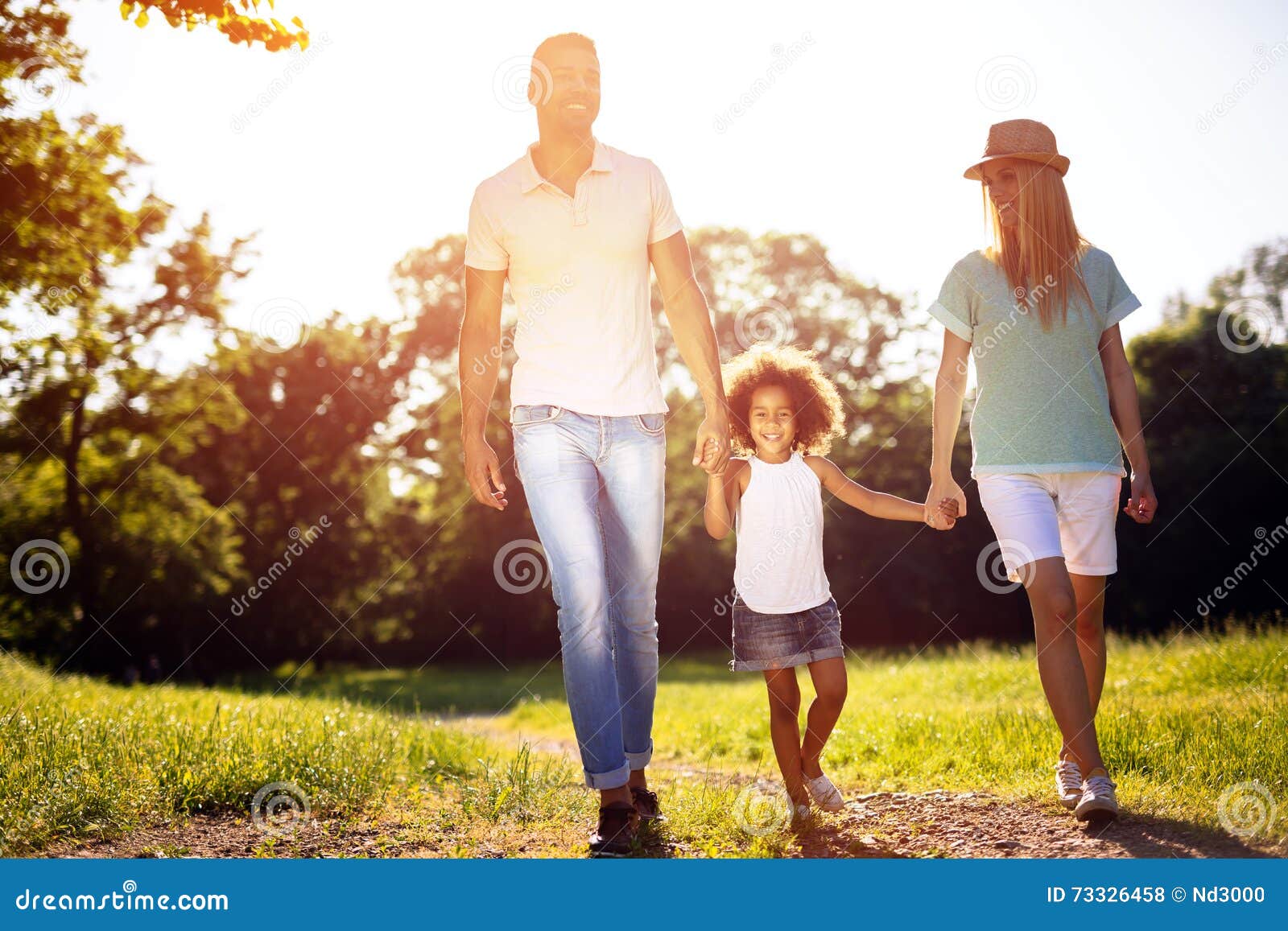Family Taking a Walk in Nature Stock Photo - Image of family, meadow ...