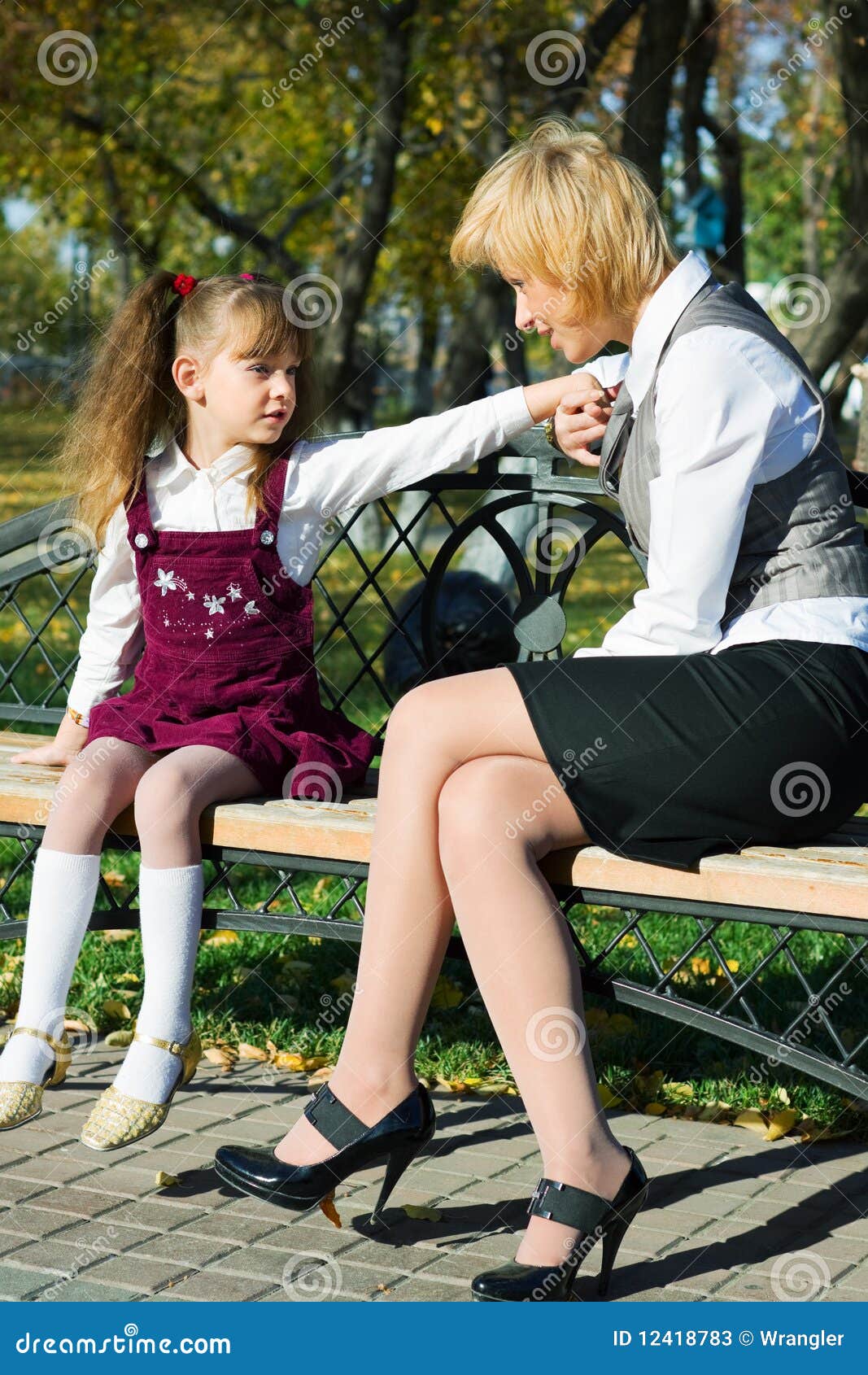 Family talking. stock image. Image of bench, outdoors - 12418783