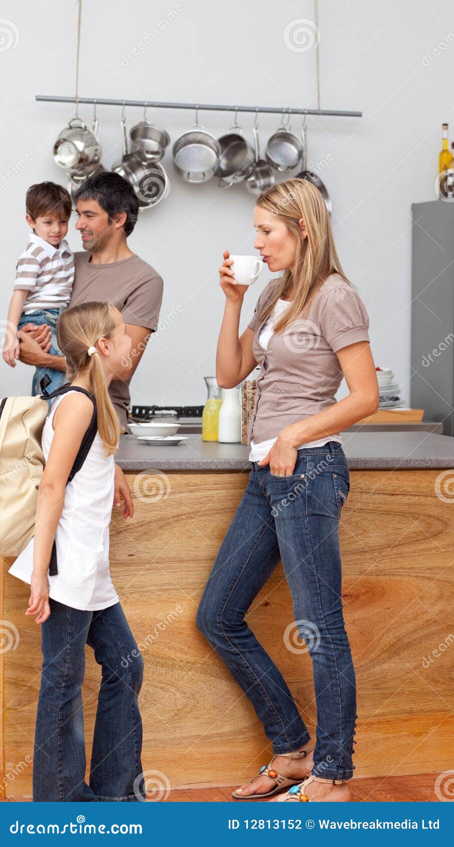 Family Talking in the Kitchen before School Stock Photo - Image of ...