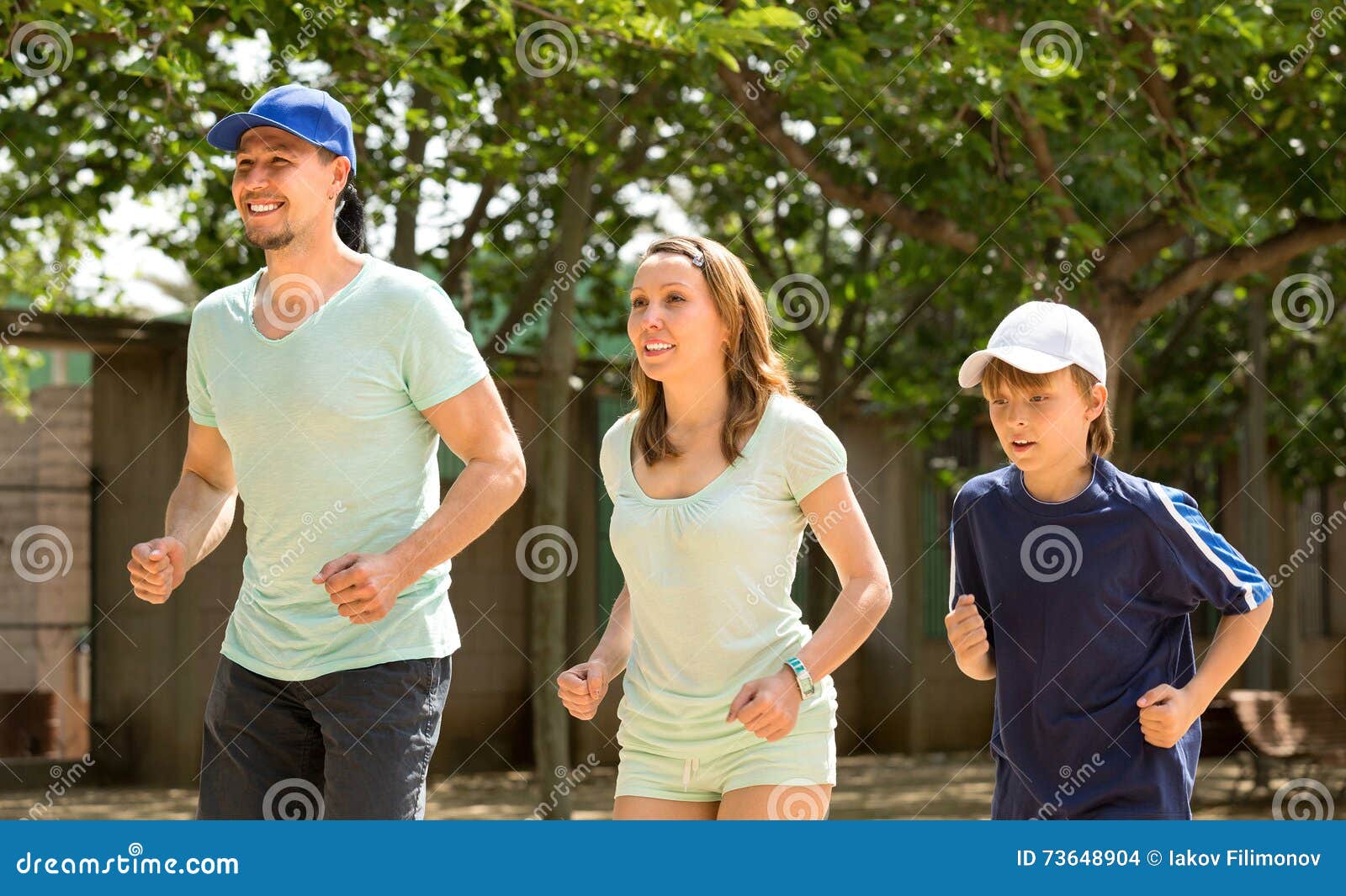 Family of Three Doing Running Outdoor Stock Photo - Image of casual ...