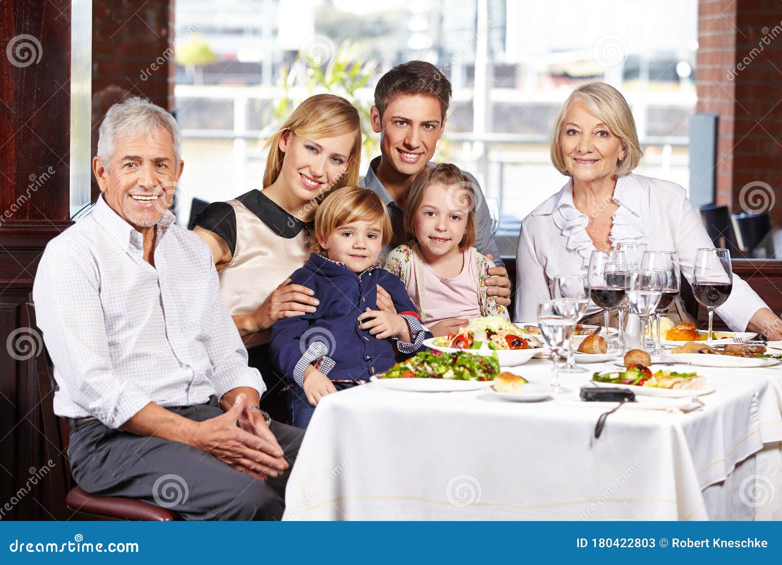 Family with Three Generations at the Table Stock Image - Image of group ...