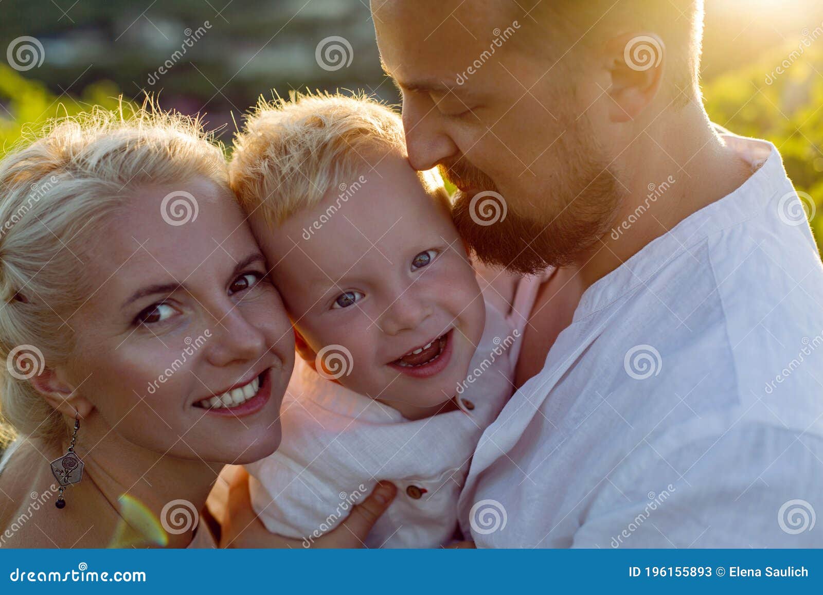 Family of Three in Light Clothes Stand in a Grape Field Stock Image ...