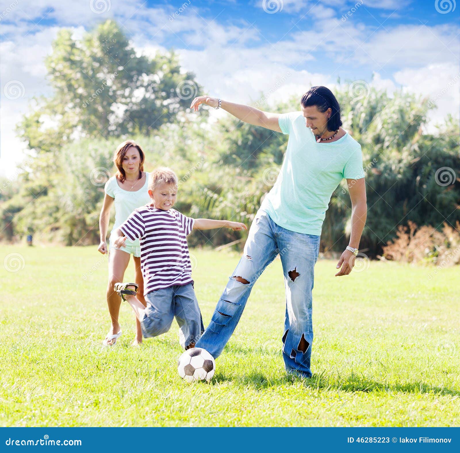 Family of Three Playing with Ball Stock Image - Image of field, healthy ...