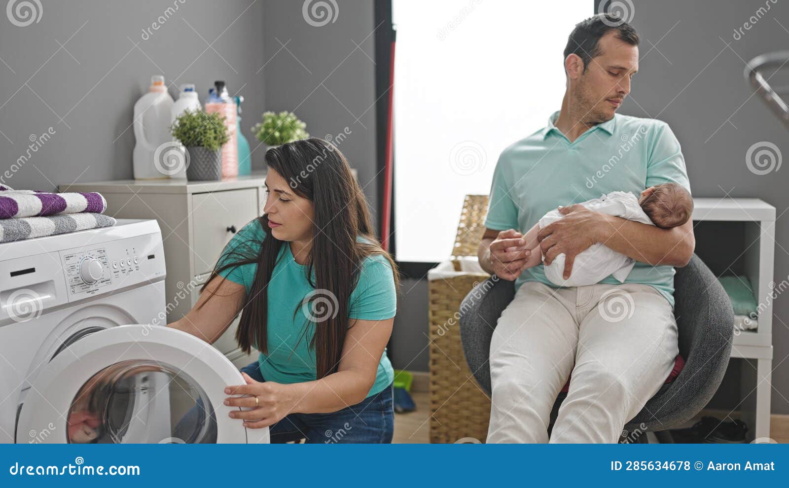 Family of Three Washing Clothes at Laundry Room Stock Photo - Image of ...