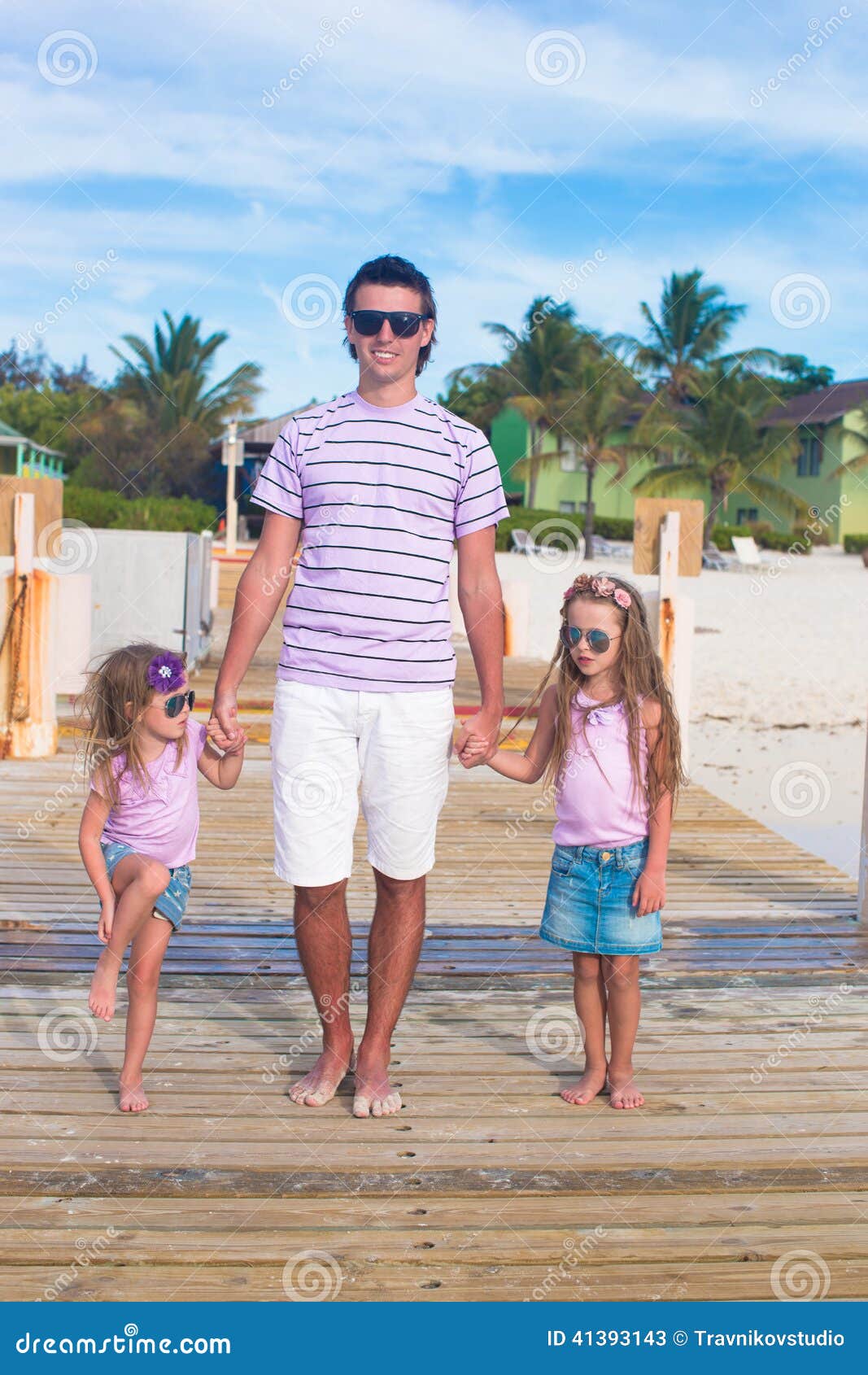 Family of Three on Wooden Jetty by the Ocean Stock Image - Image of ...