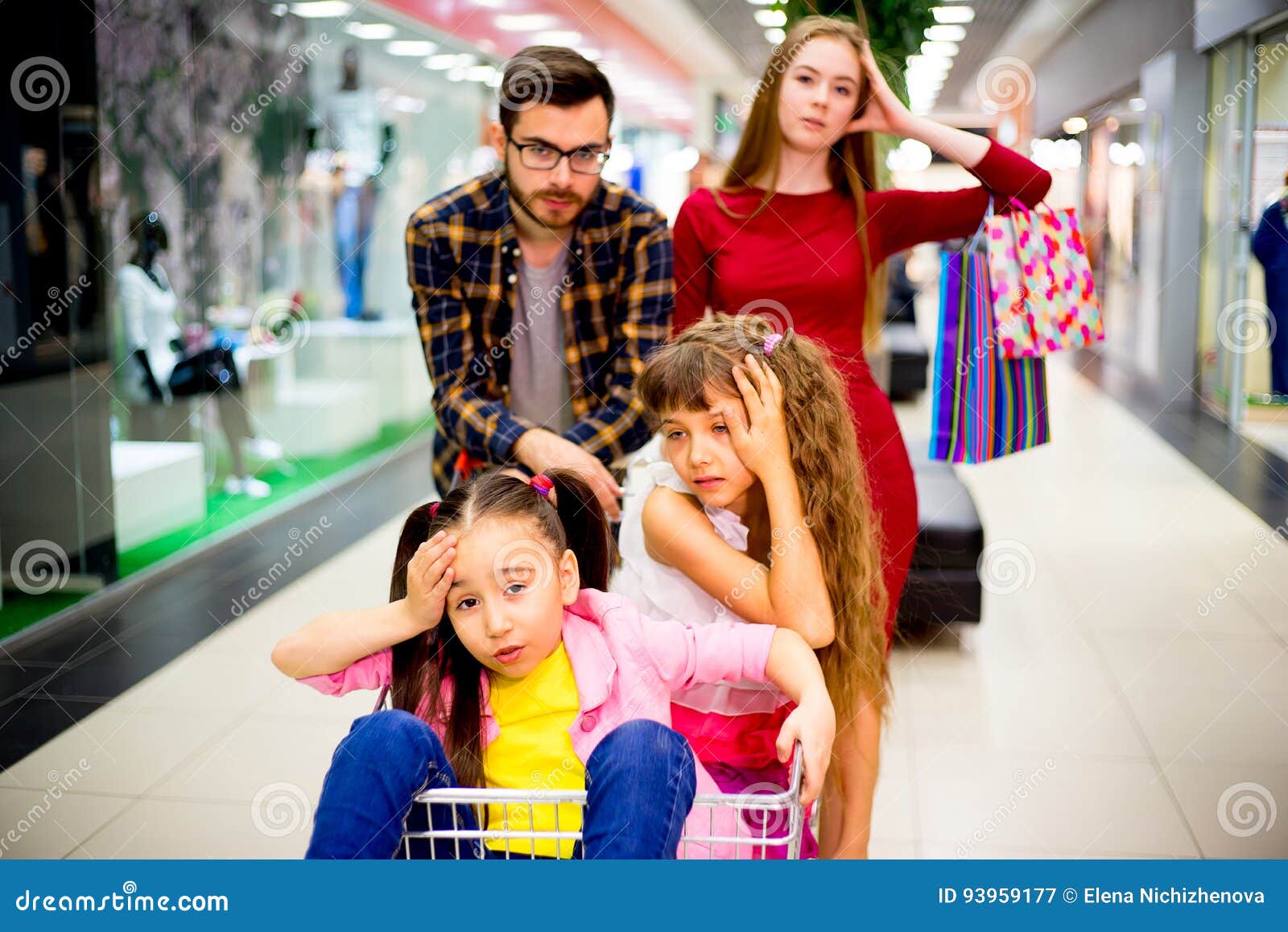 Family tired with shopping stock image. Image of products - 93959177