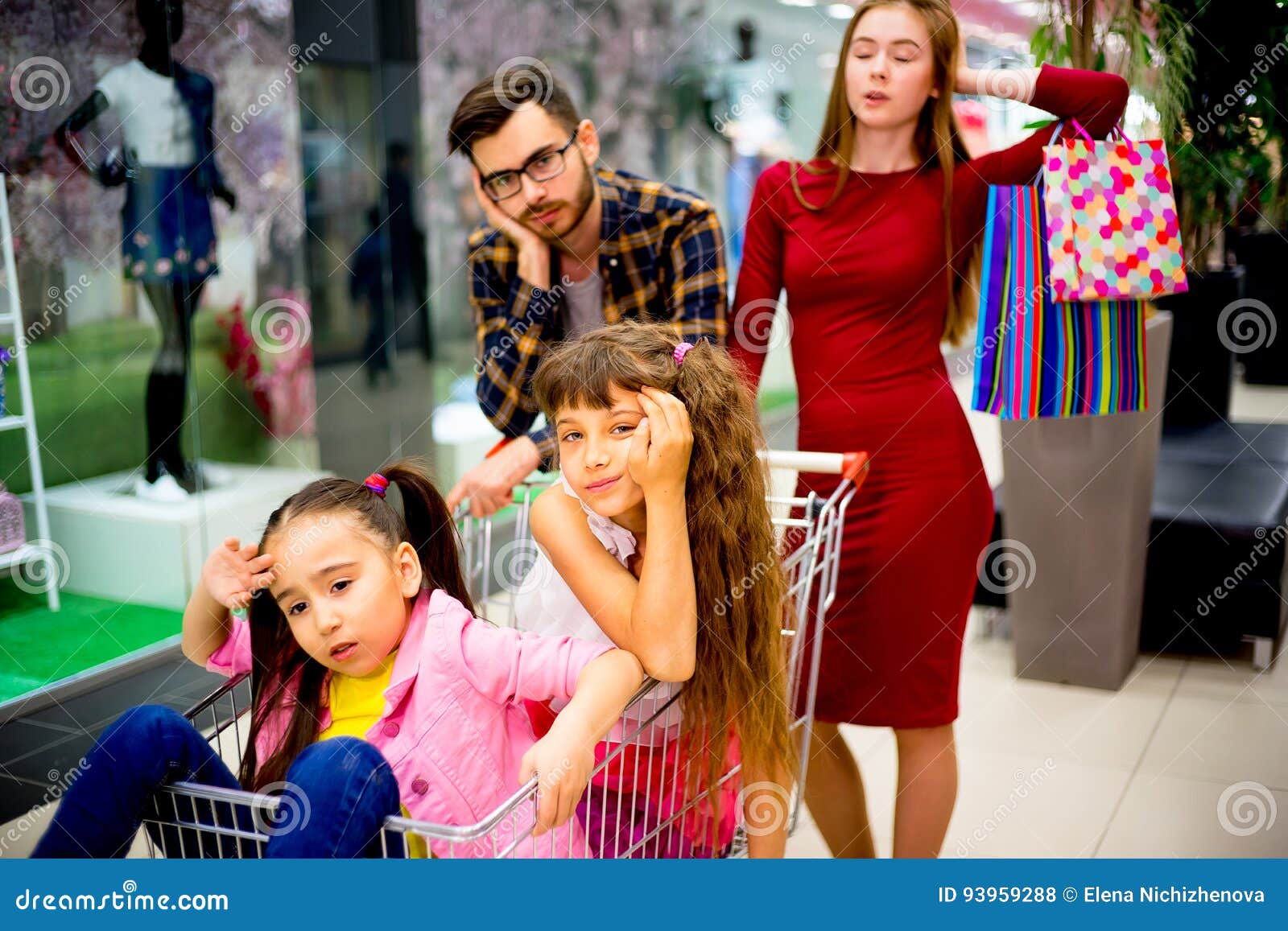 Family tired with shopping stock photo. Image of buying - 93959288