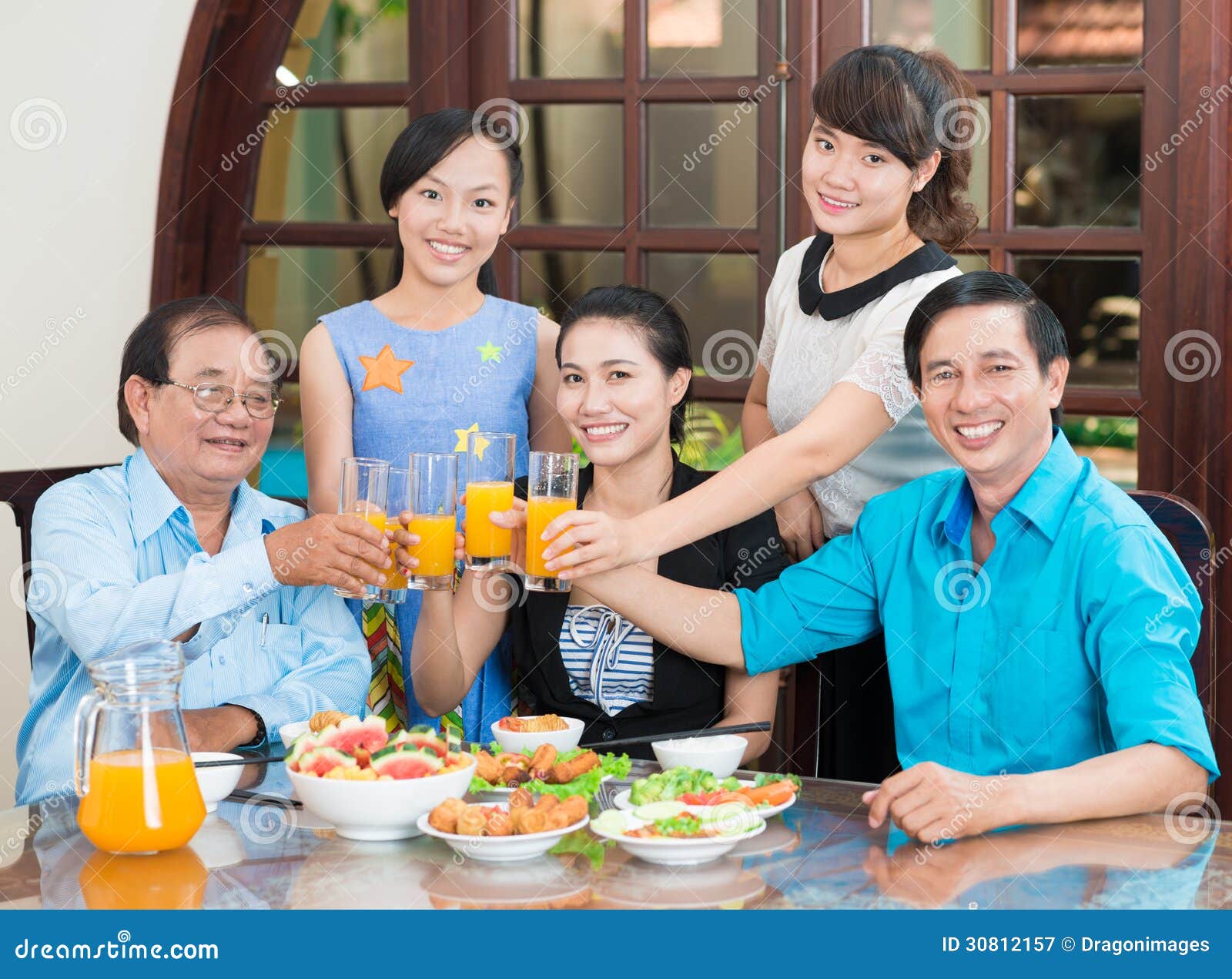Family toasting stock image. Image of housewife, event - 30812157