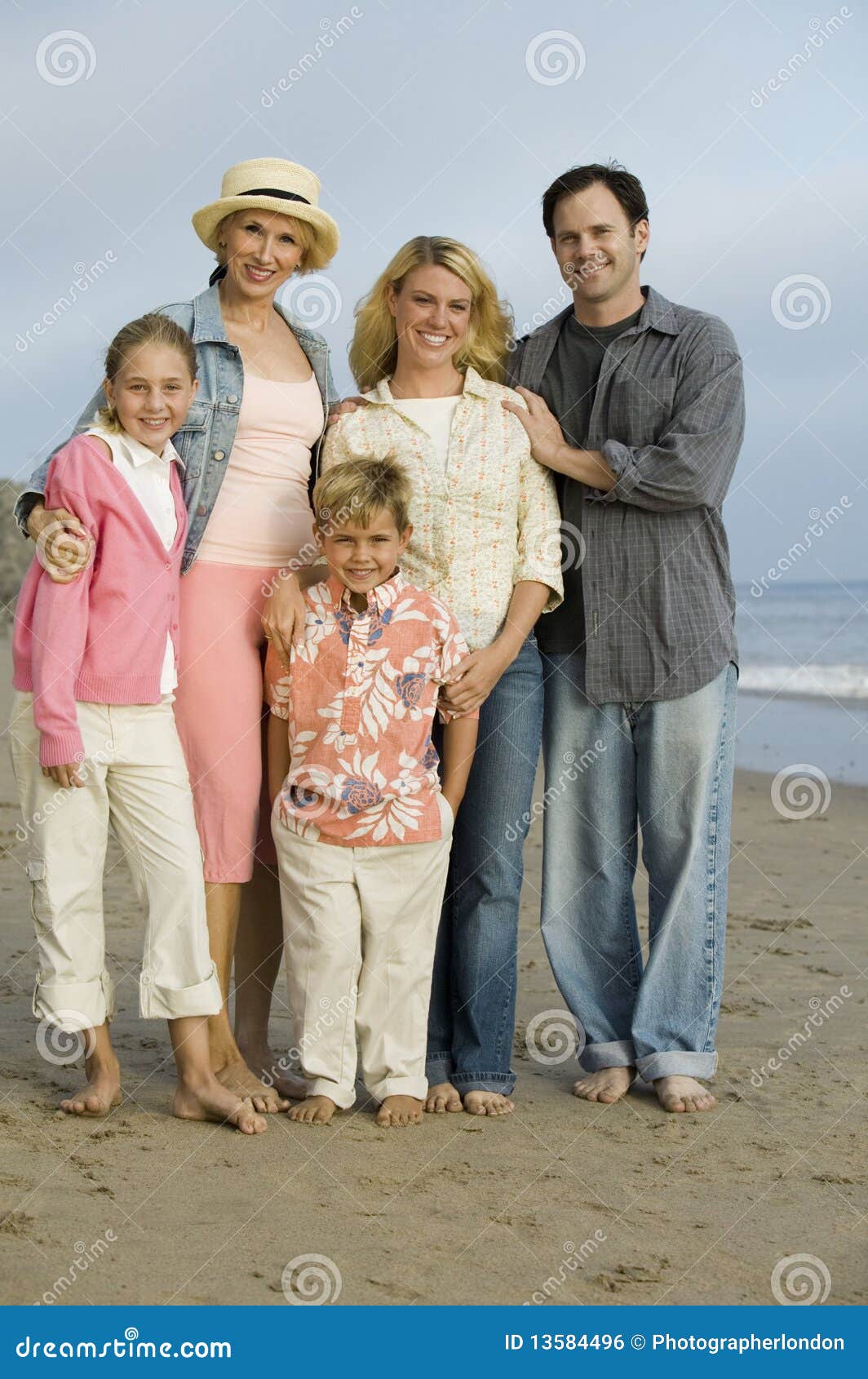 Family Together on Beach stock photo. Image of waters - 13584496