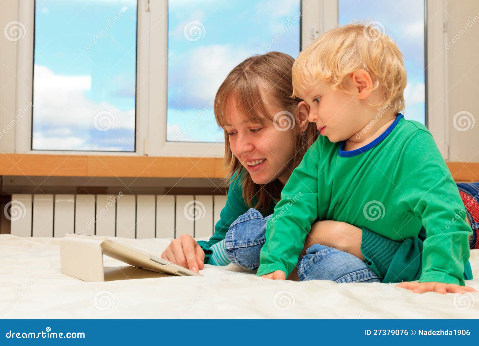 Family with Touch Pad at Home Stock Photo - Image of learn, female ...