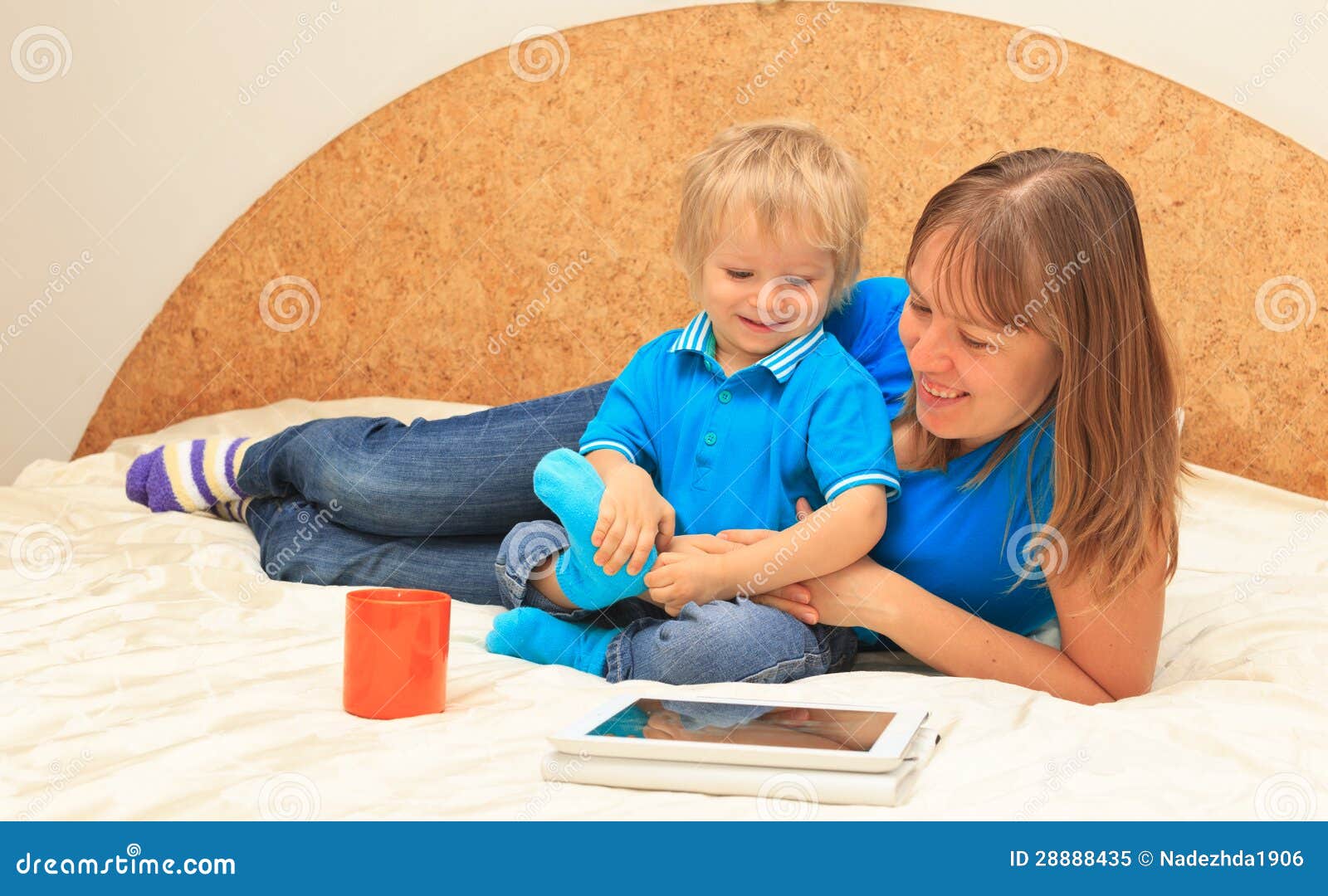 Family with Touch Pad at Home Stock Image - Image of family, hold: 28888435